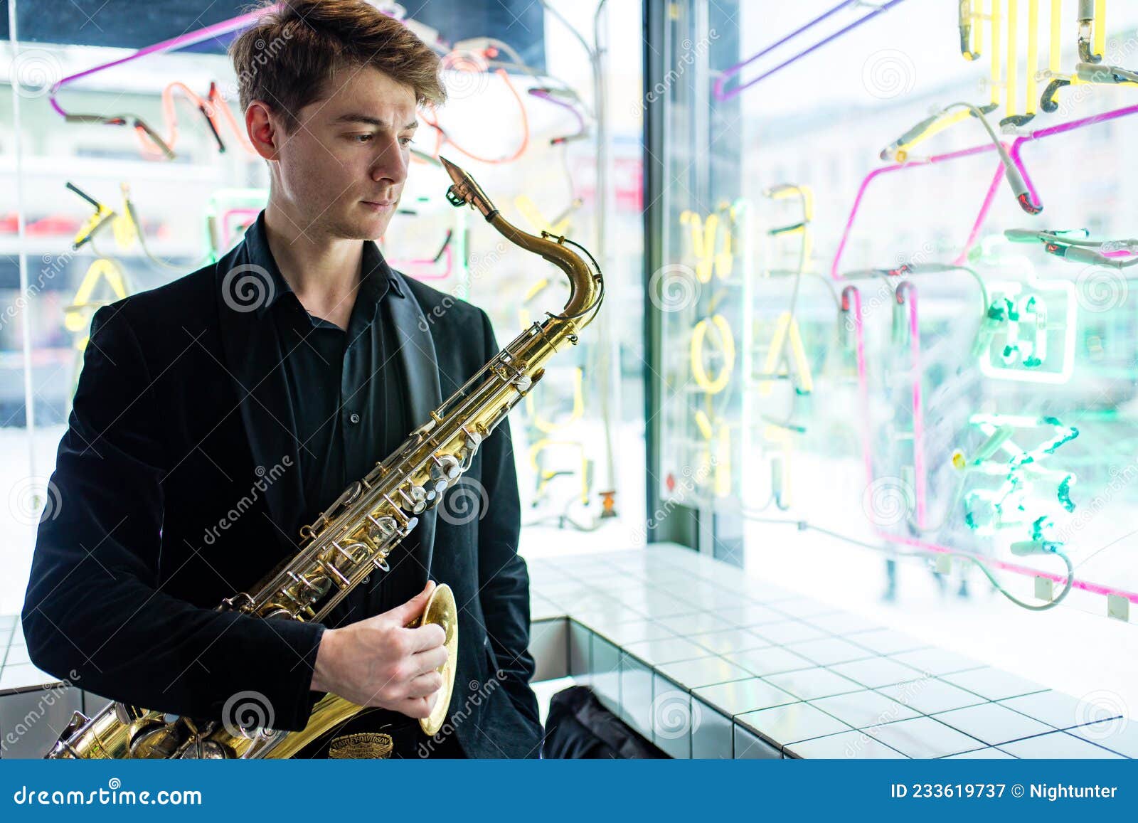 Student Learning To Play on Saxophone in the Room Stock Image - Image ...
