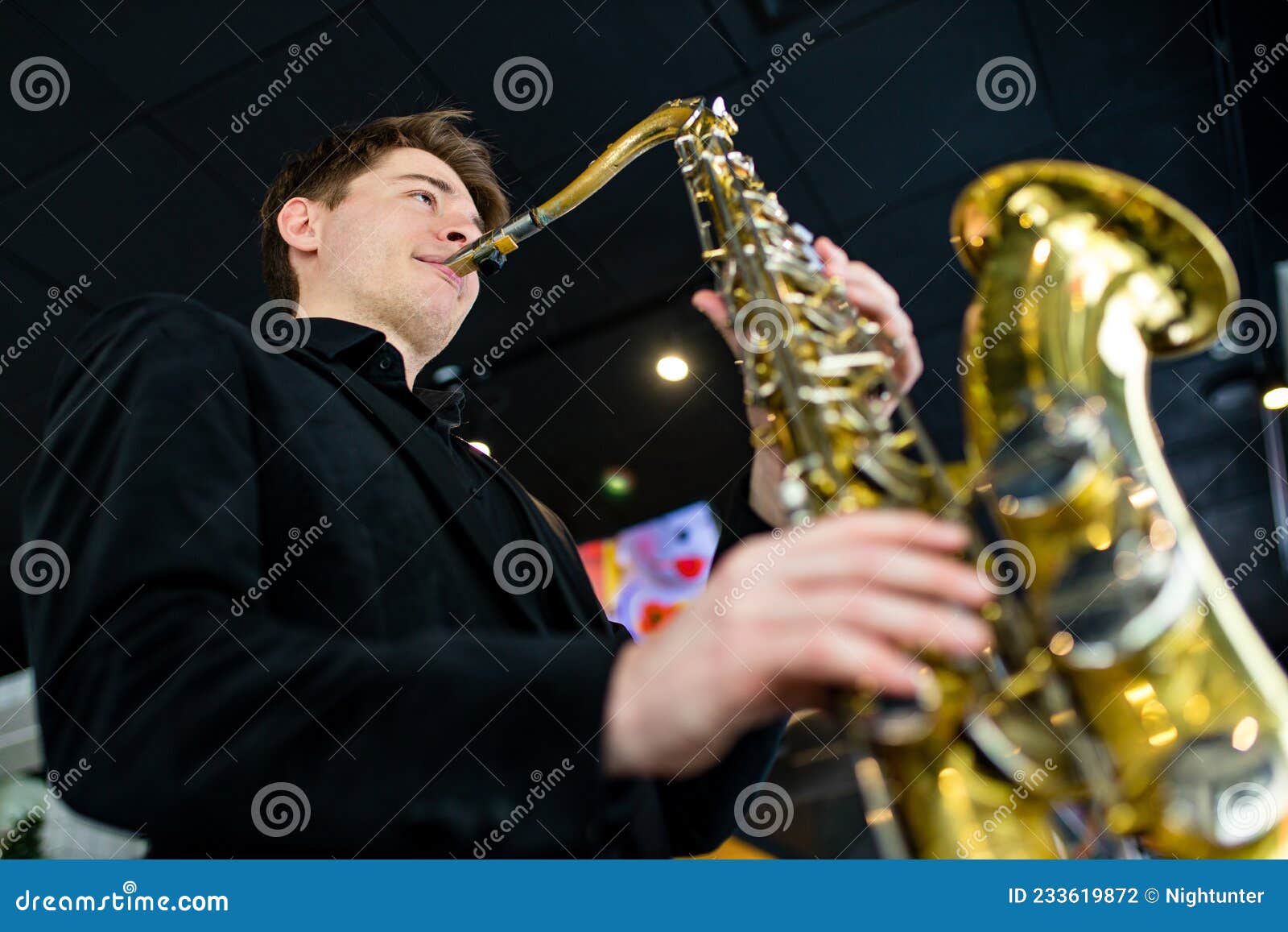 Student Learning To Play on Saxophone in the Room Stock Photo - Image ...