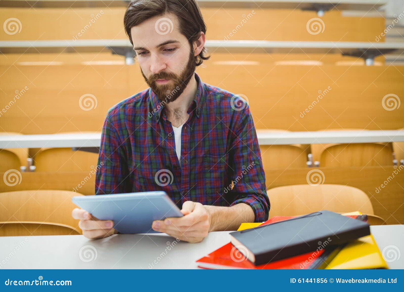 Student in Lecture Hall Using Tablet Stock Photo - Image of indoors ...