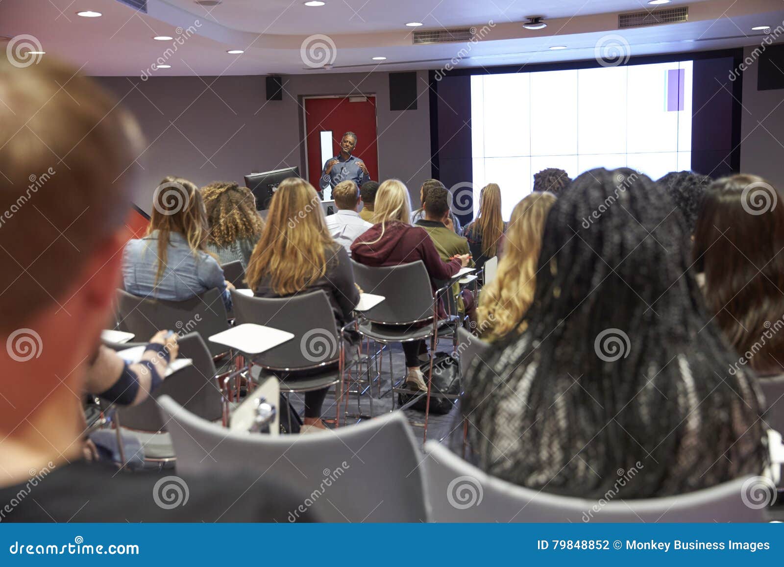 Student Lecture in Modern University Classroom, Back View Stock Photo ...