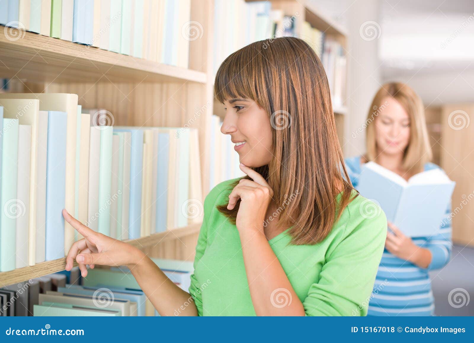 Student in Library - Two Woman Choose Book Stock Photo - Image of smile ...