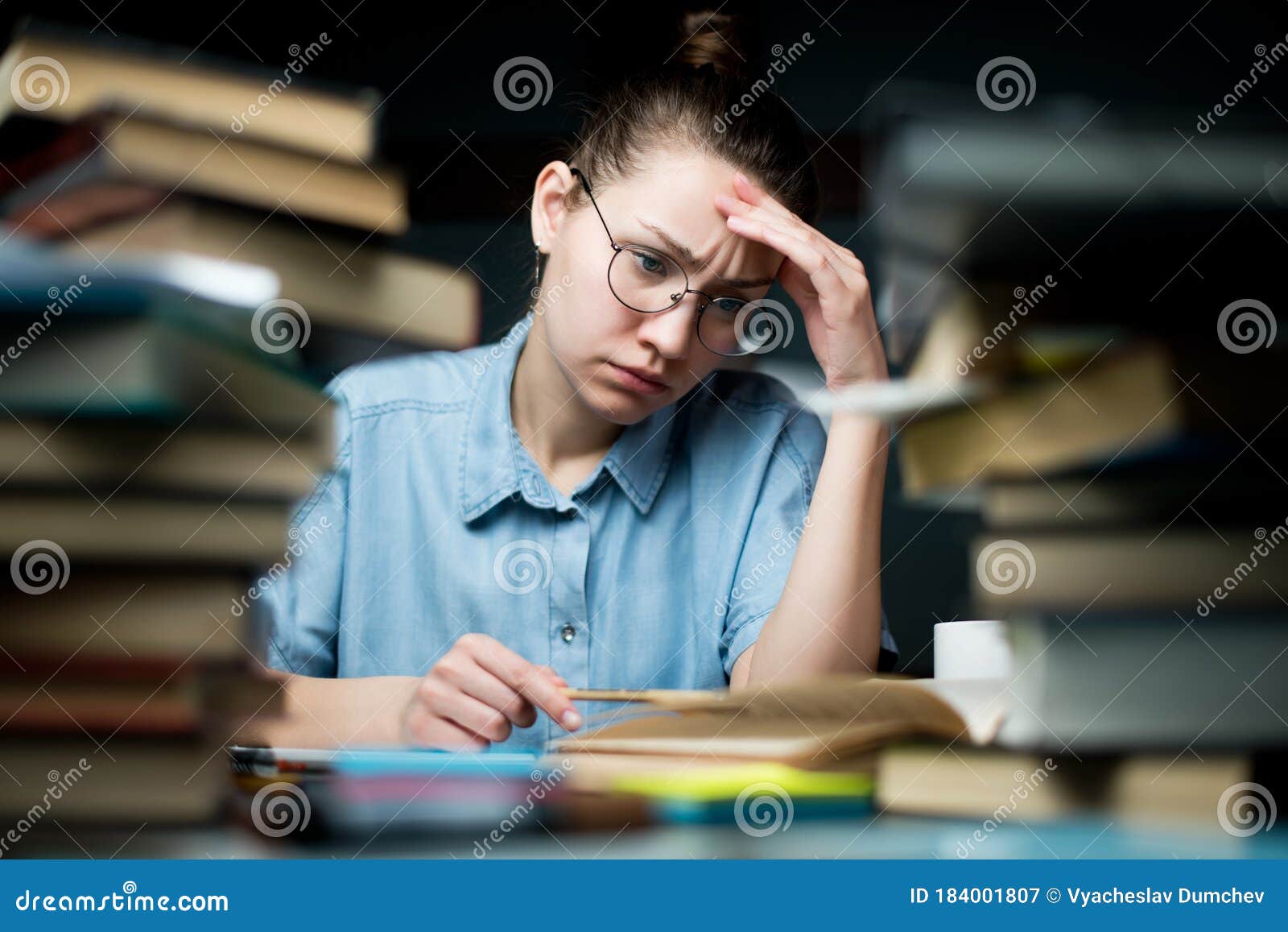 The Student Looks Tiredly at the Study Materials, but Continues To ...