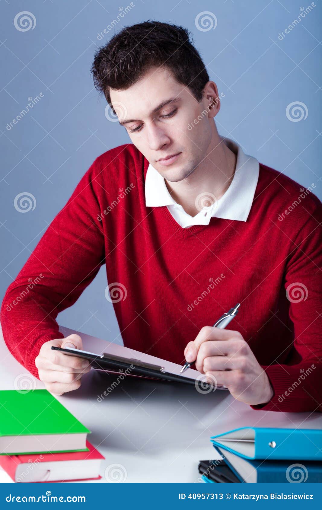 A student making notes stock image. Image of concentrated - 40957313