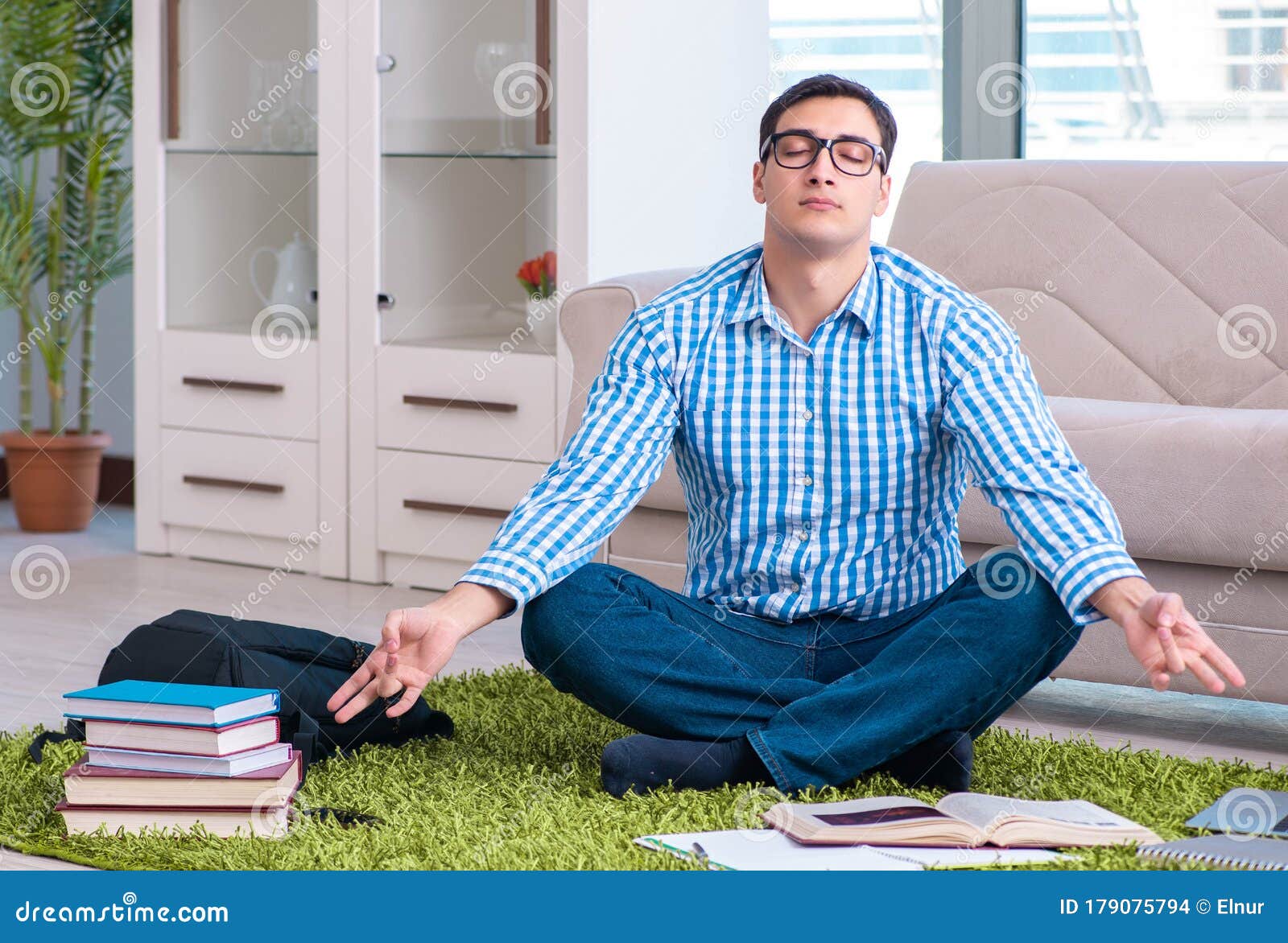 Student Meditating and Preparing for University Exams Stock Photo ...