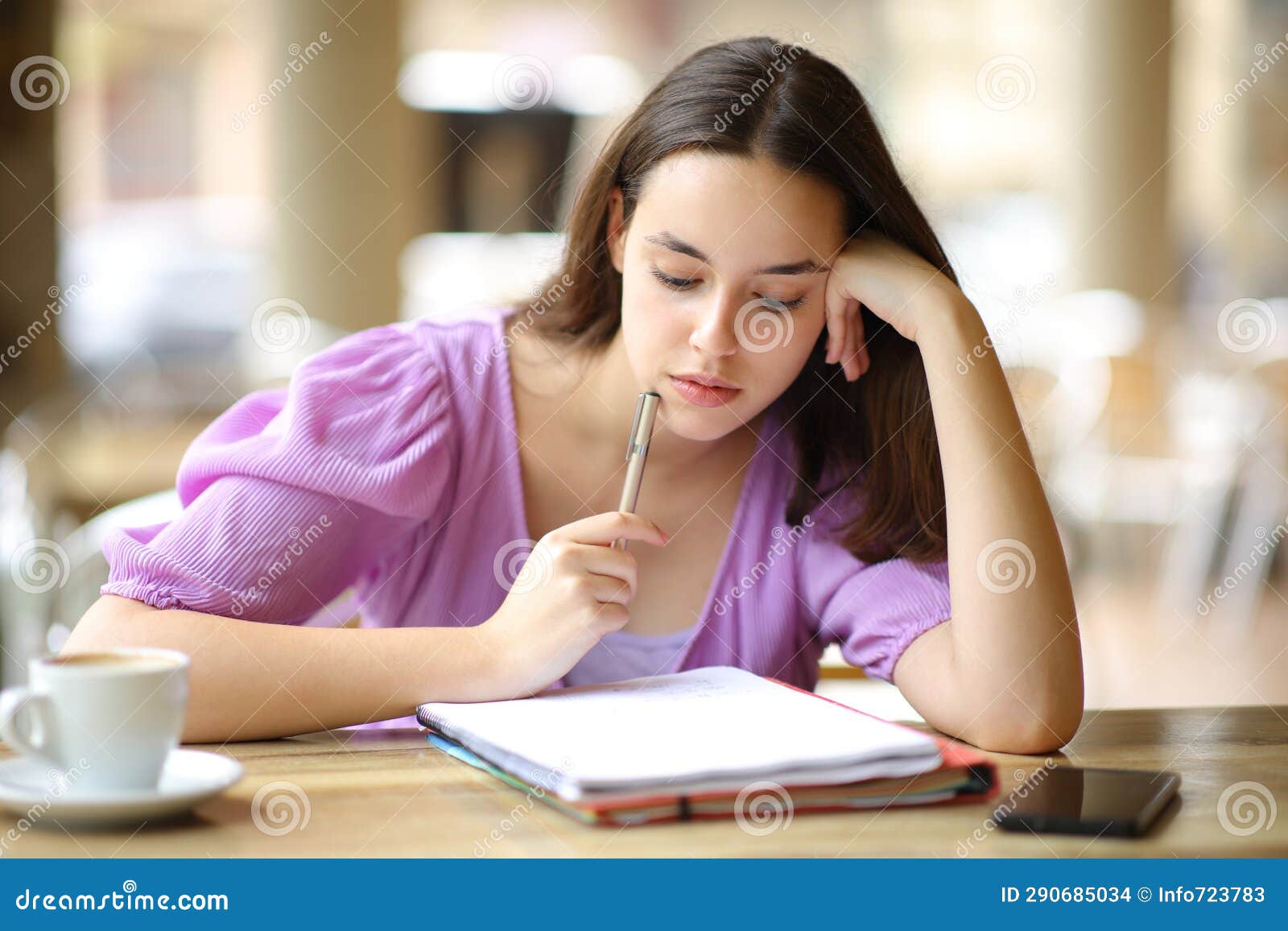Student Memorizing Notes in a Restaurant Terrace Stock Photo - Image of ...