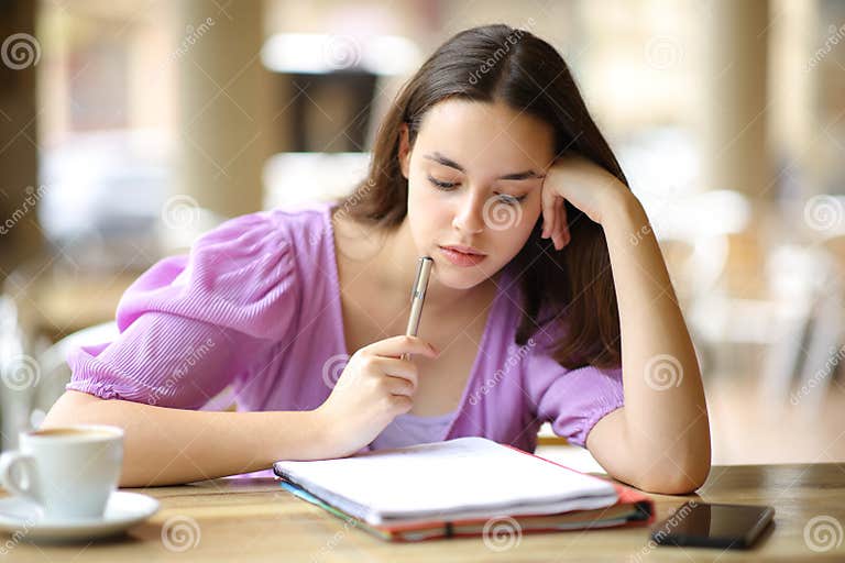 Student Memorizing Notes in a Restaurant Terrace Stock Photo - Image of ...