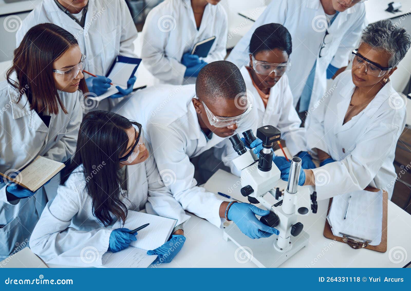 Student, Microscope and Science in University Class, Group and Learning ...