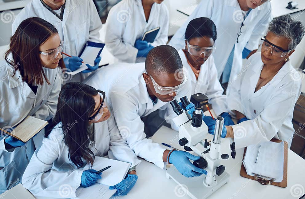 Student, Microscope and Science in University Class, Group and Learning ...