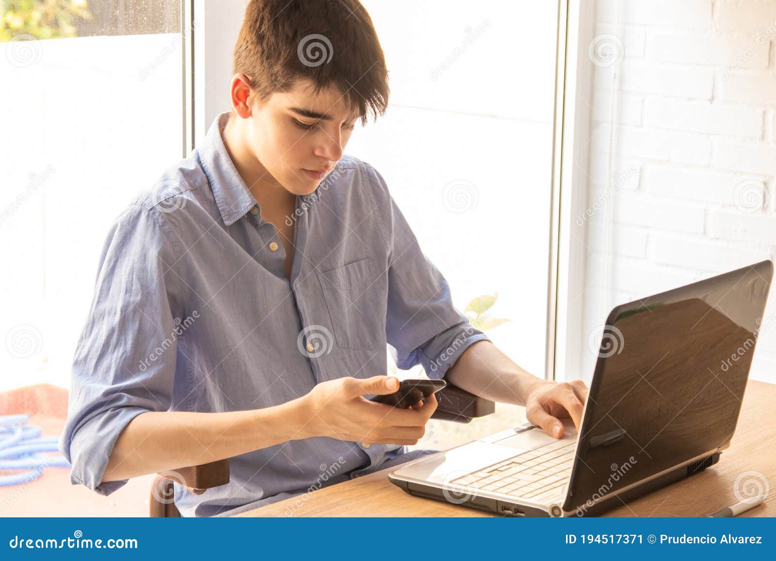 Student with Mobile Phone and Laptop Stock Image - Image of training ...