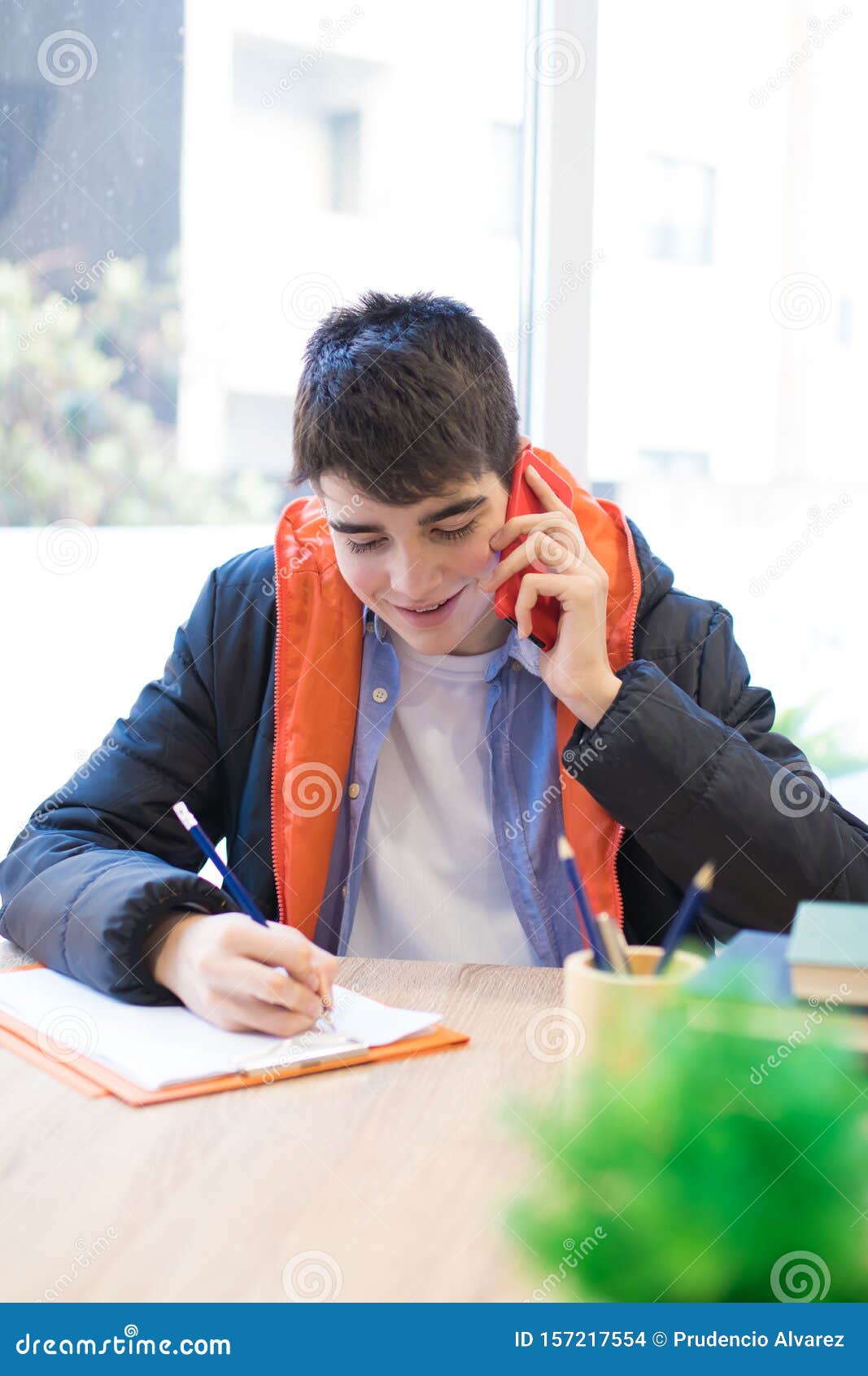 Student with mobile phone stock photo. Image of teaching - 157217554