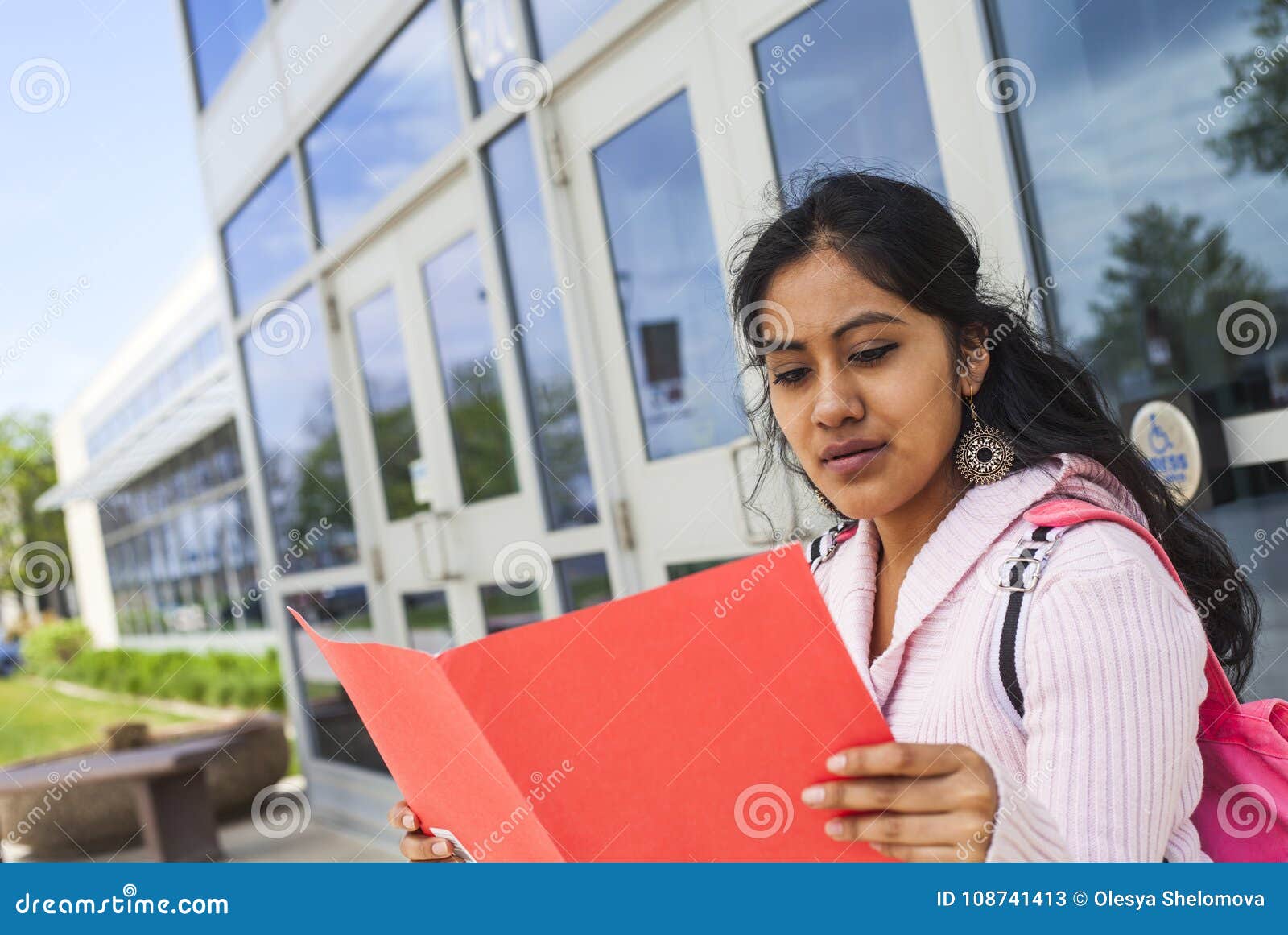 Female Student Reading Textbook Stock Image - Image of attractive ...