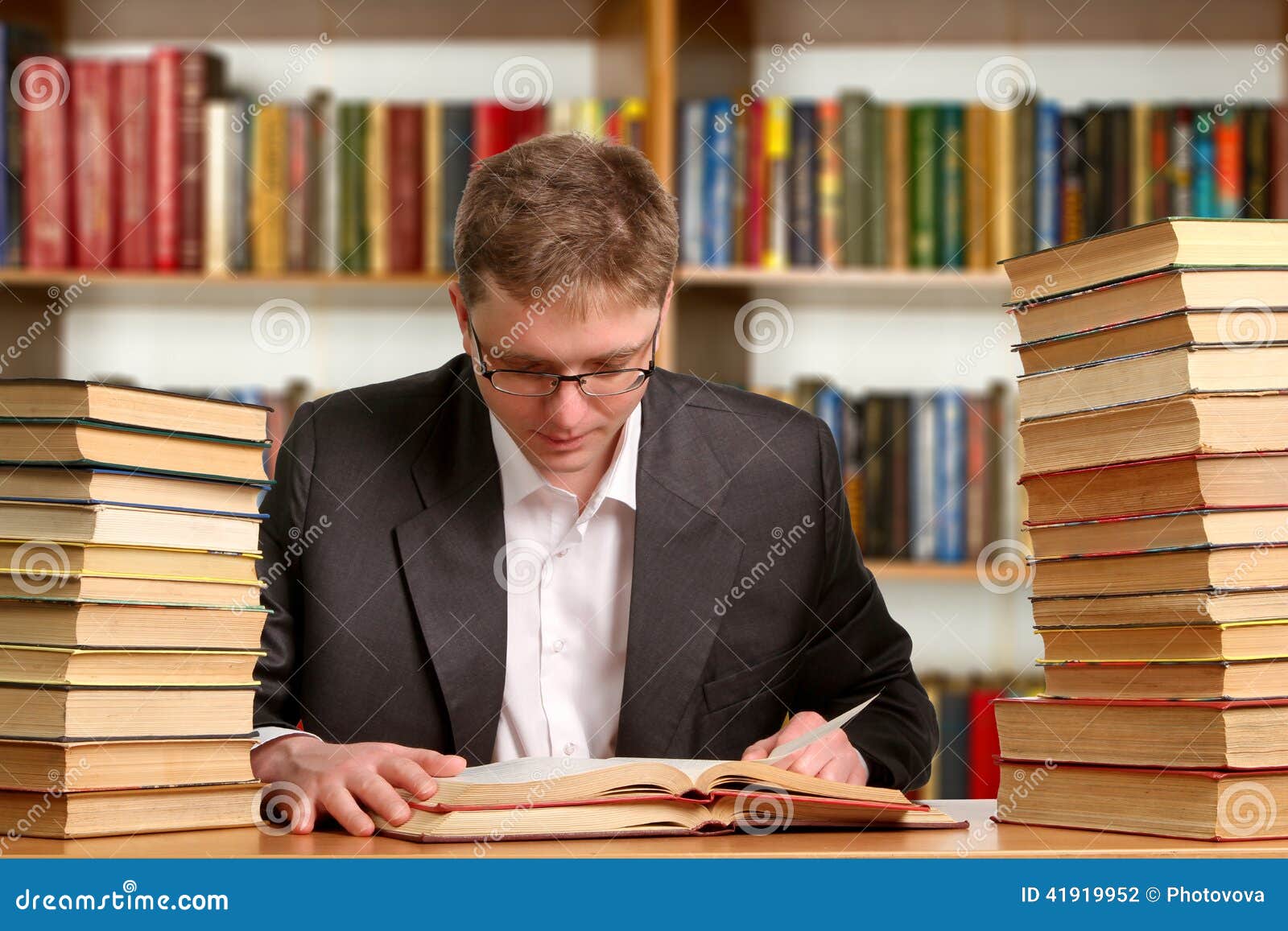 Student with open book stock photo. Image of campus, book - 41919952