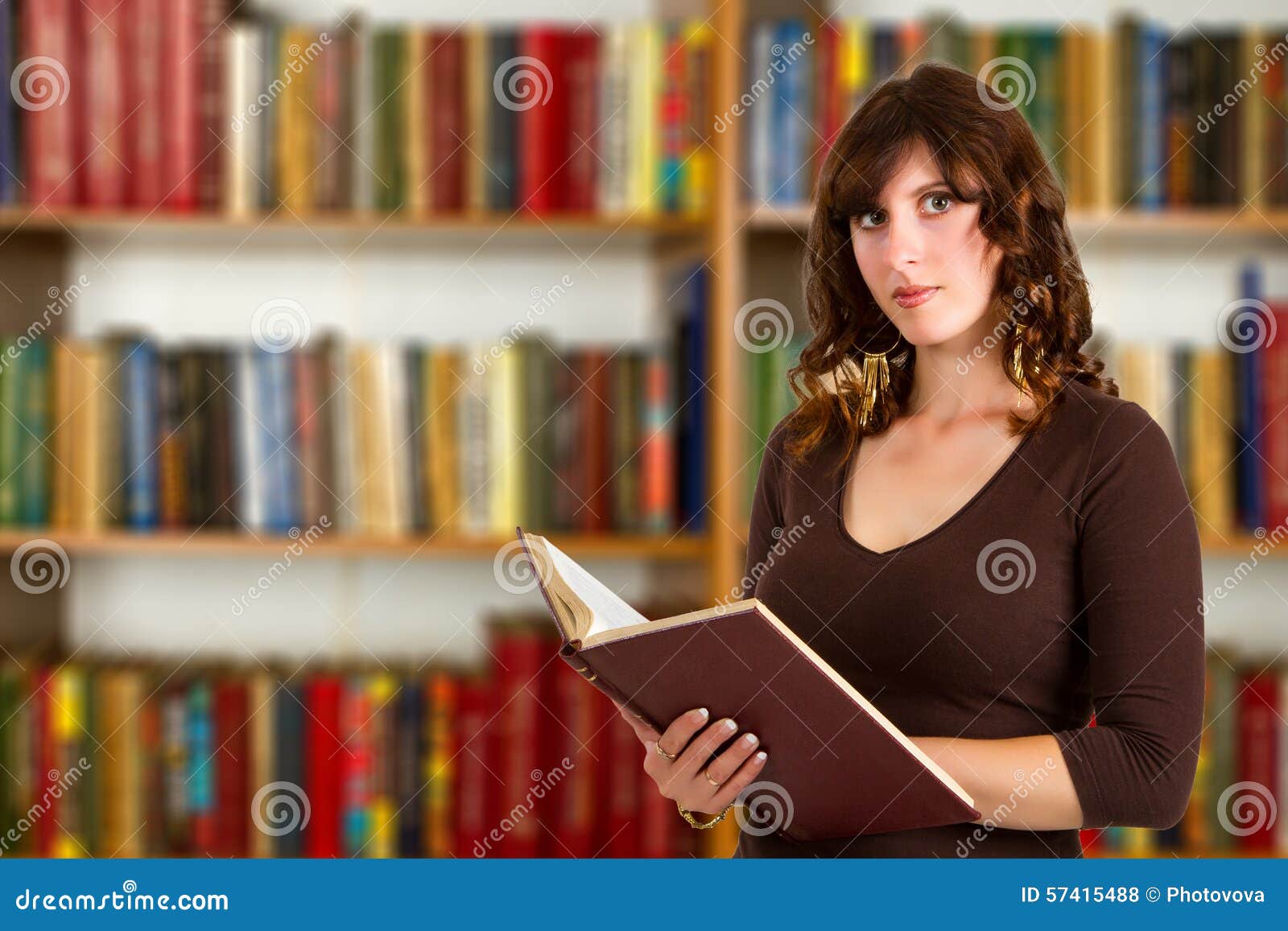 Student with open book stock photo. Image of bookshelf - 57415488