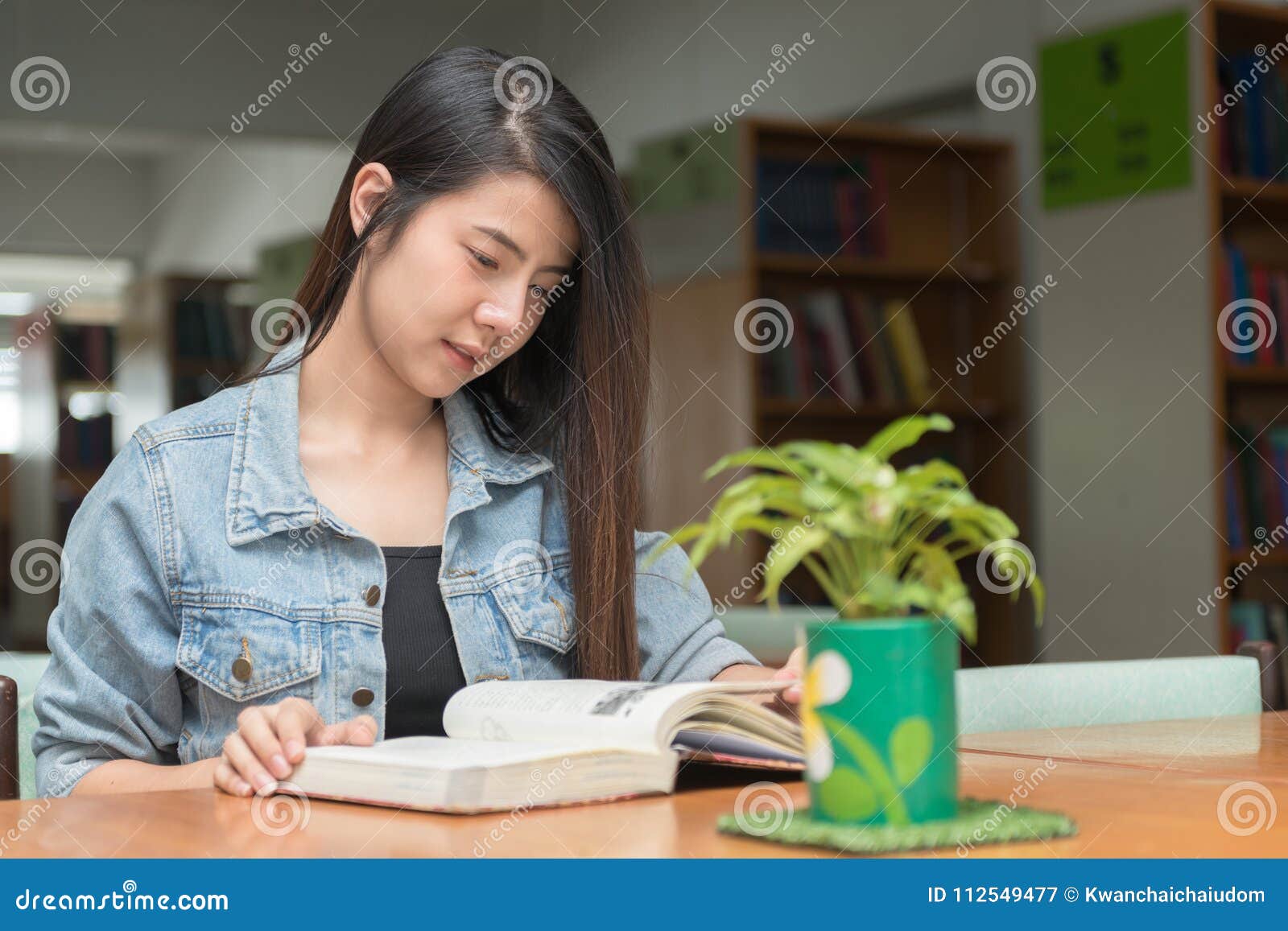 Student Open Book Reading it in University Library Stock Image - Image ... Student Open Book Reading it in University Library Stock Image - Image ...
