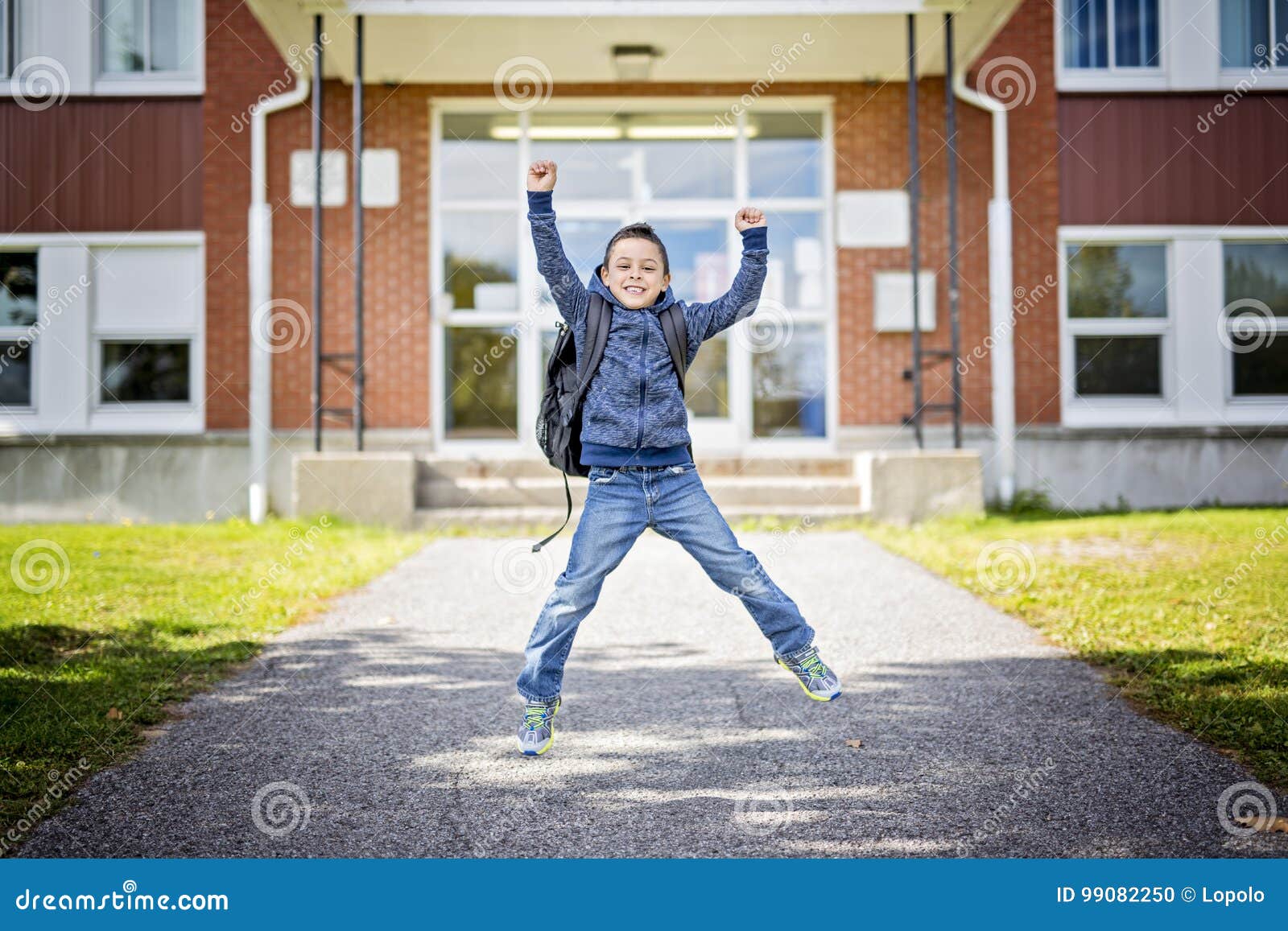Student Outside School Standing Smiling Stock Photo - Image of young ...