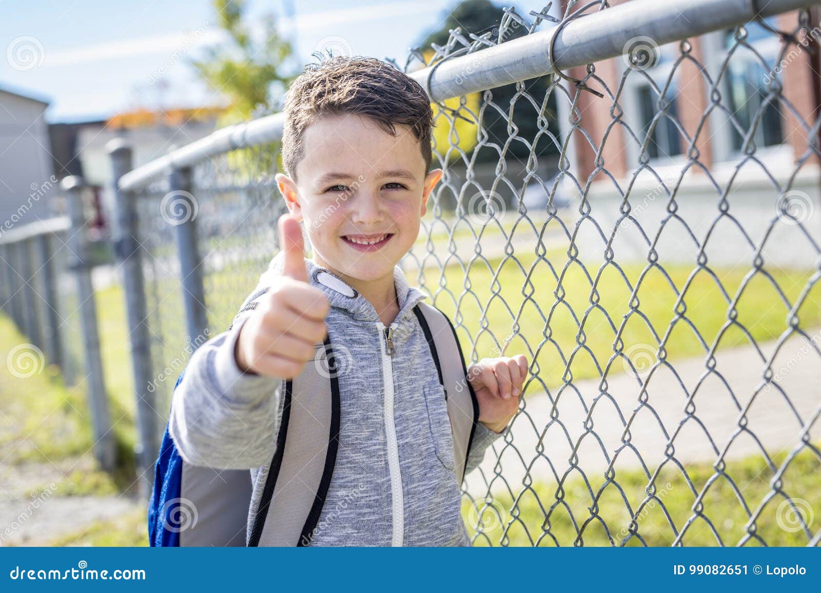 Student Outside School Standing Smiling Stock Image - Image of school ...