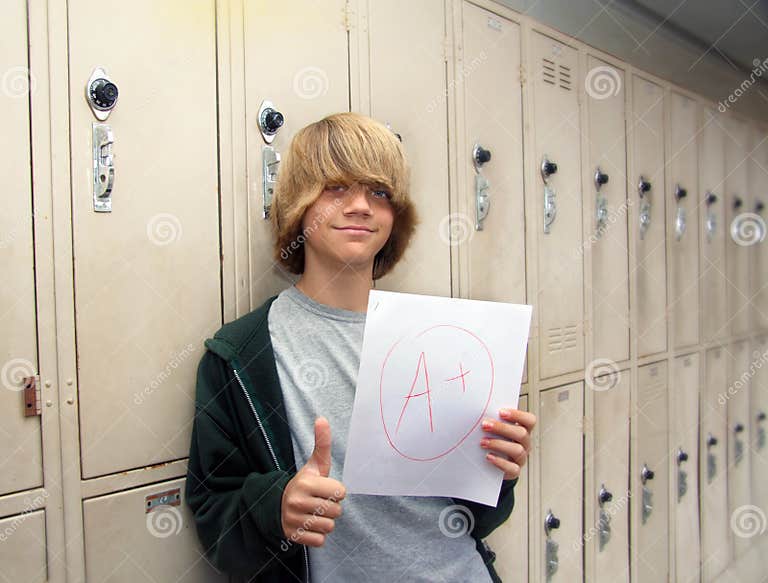 Student with a+ Paper stock image. Image of good, cute - 26229581