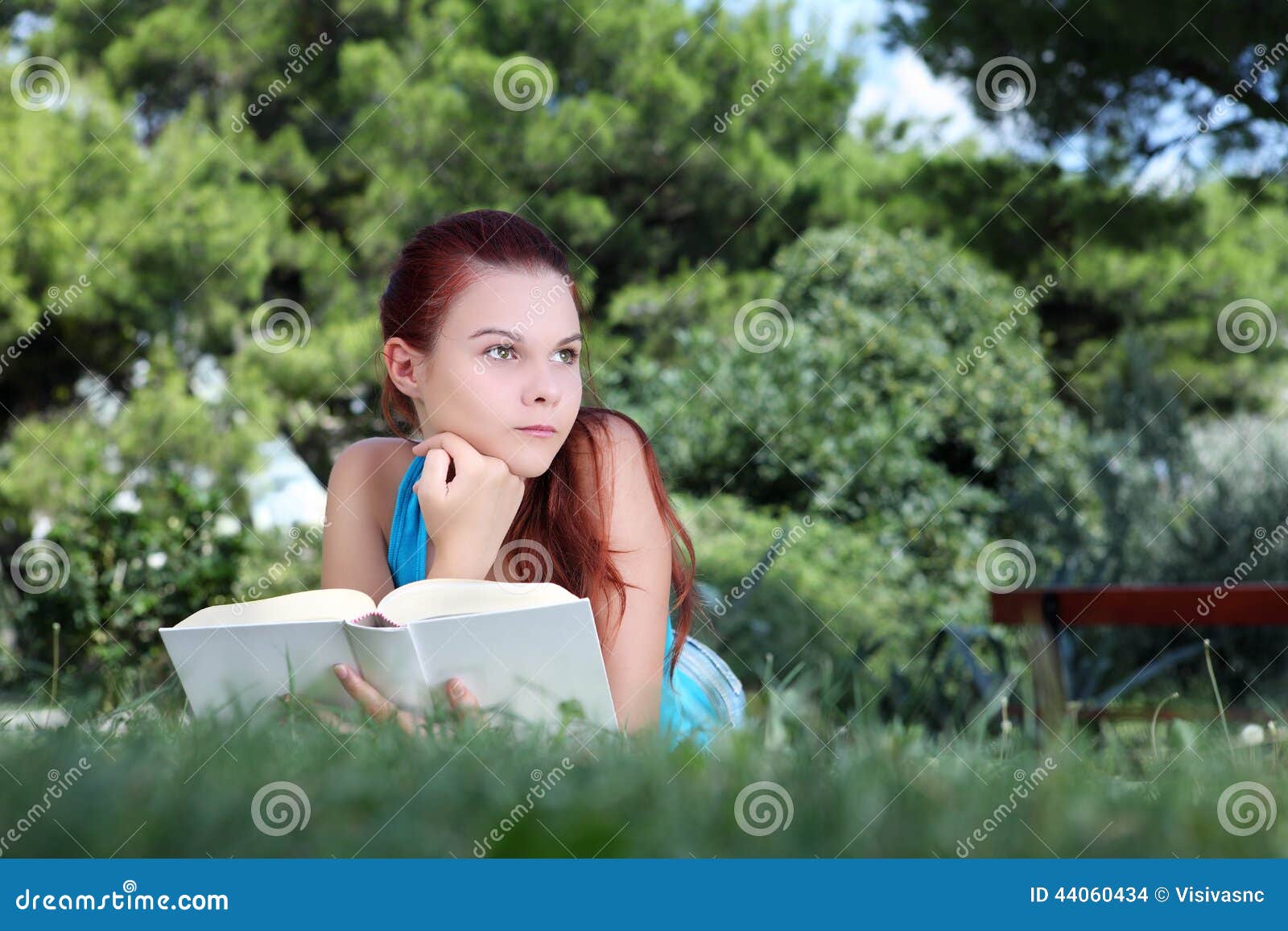 Student in Park with Open Book Stock Photo - Image of caucasian, learn ...