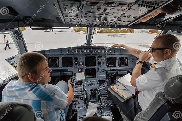 Student and Pilot Talking in the Plane Cockpit Editorial Stock Photo ...