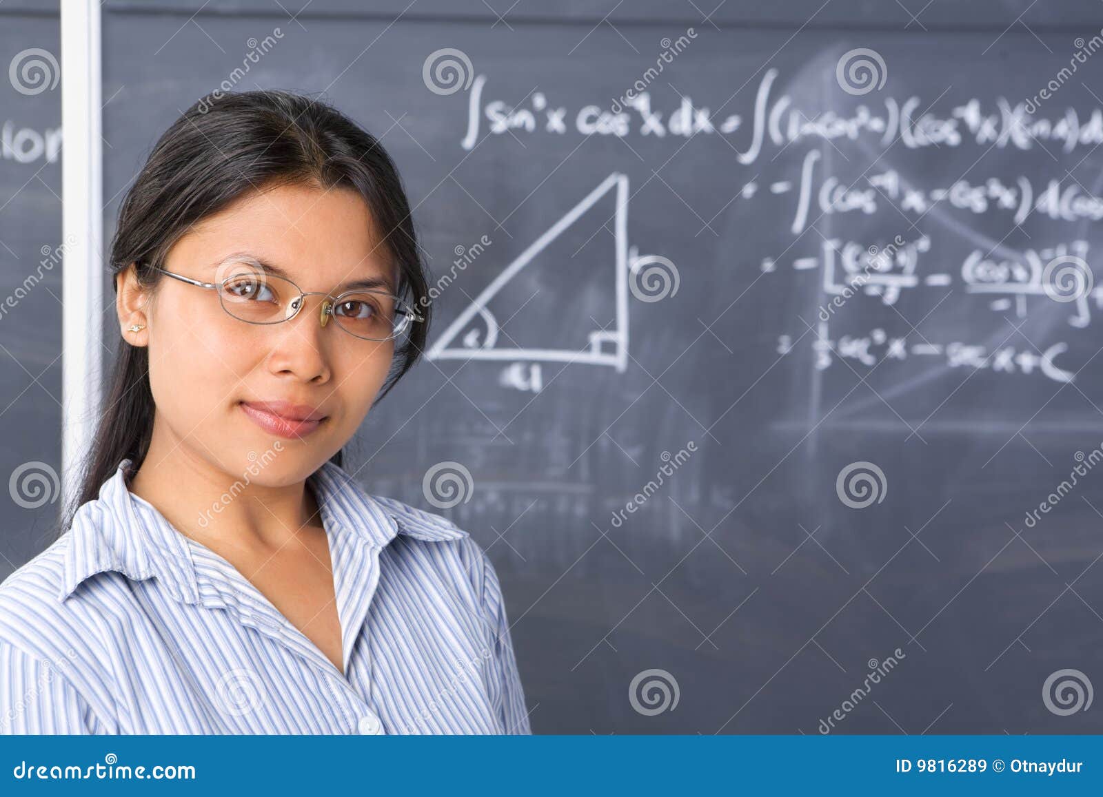 Student Pose in Front of Blackboard Stock Image - Image of equation ...