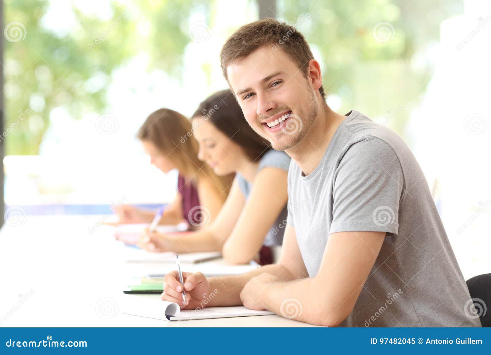Student Posing in a Classroom Looking at You Stock Image - Image of ...