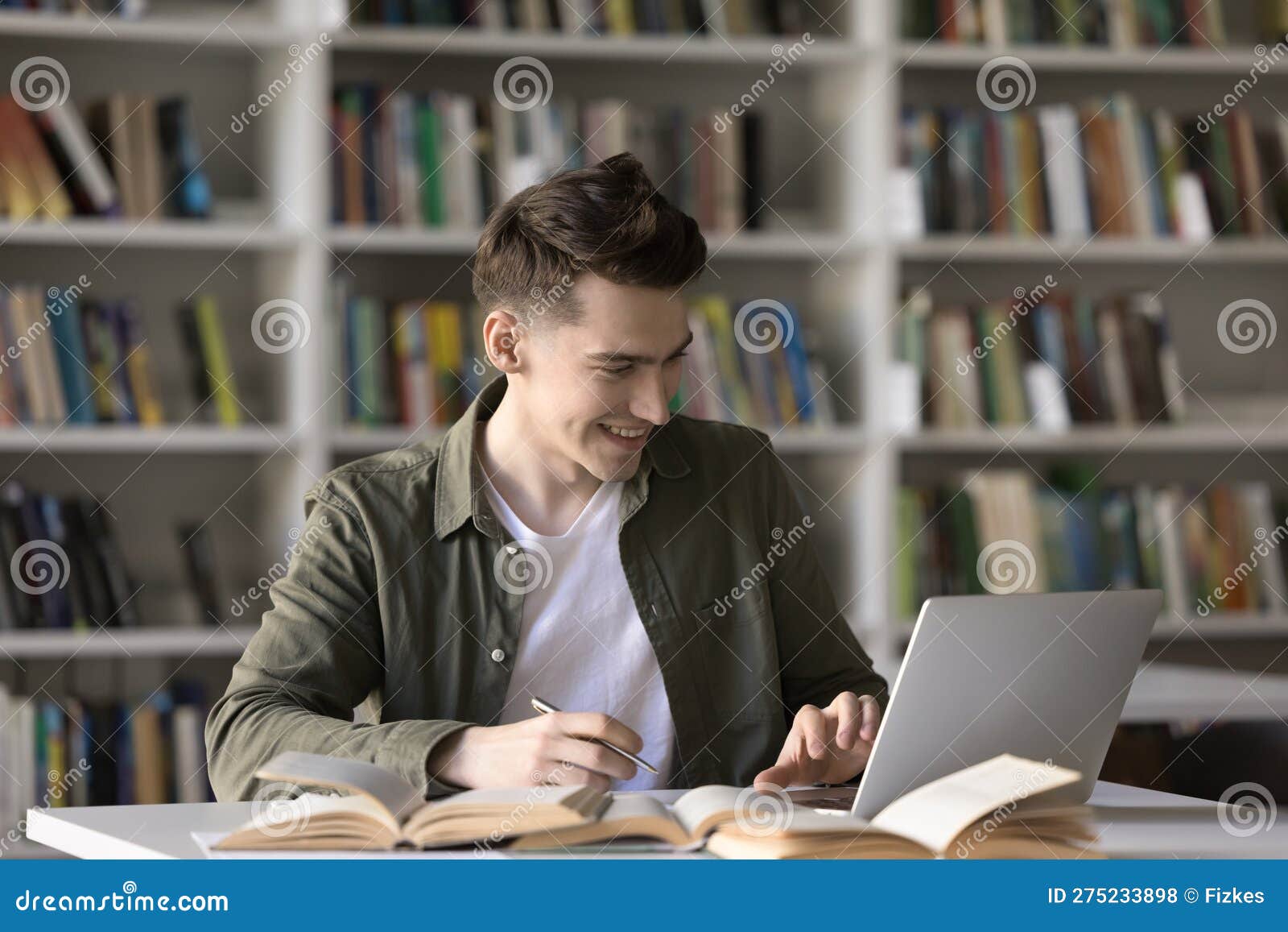 Student Prepare Assignment, Learn Theory, Studying in Library Using ...