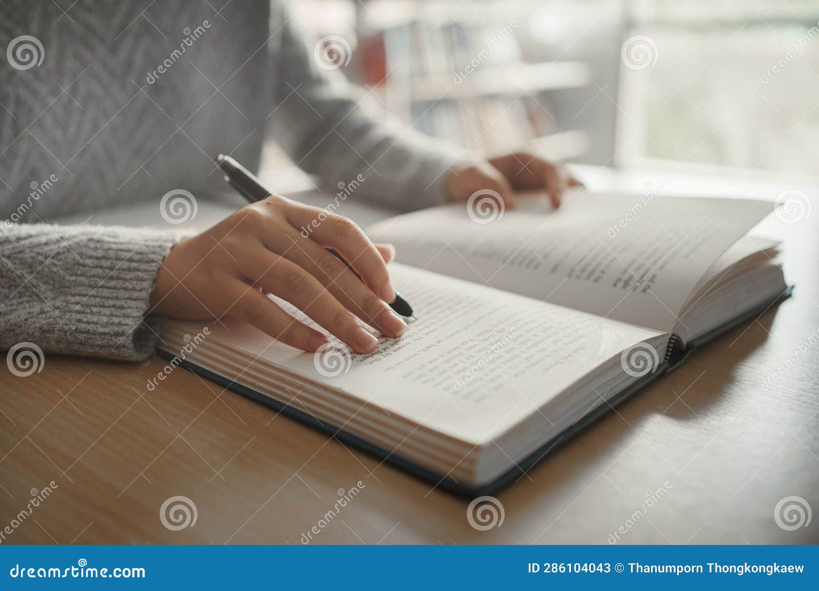 Student Preparing for College Test, Exam, Reading Book, Studying ...