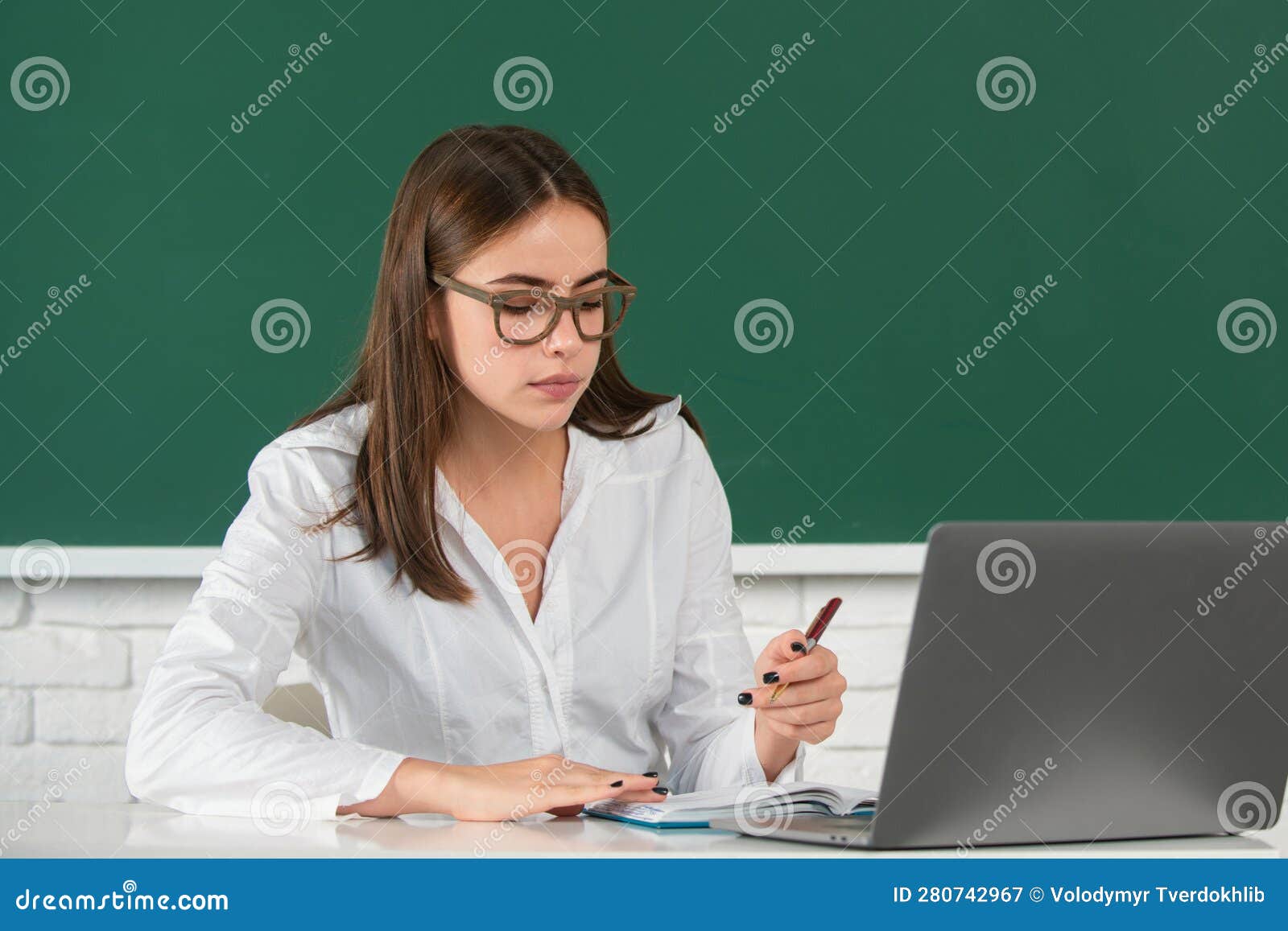 Student Preparing Exam and Learning Lessons in School Classroom, Online ...