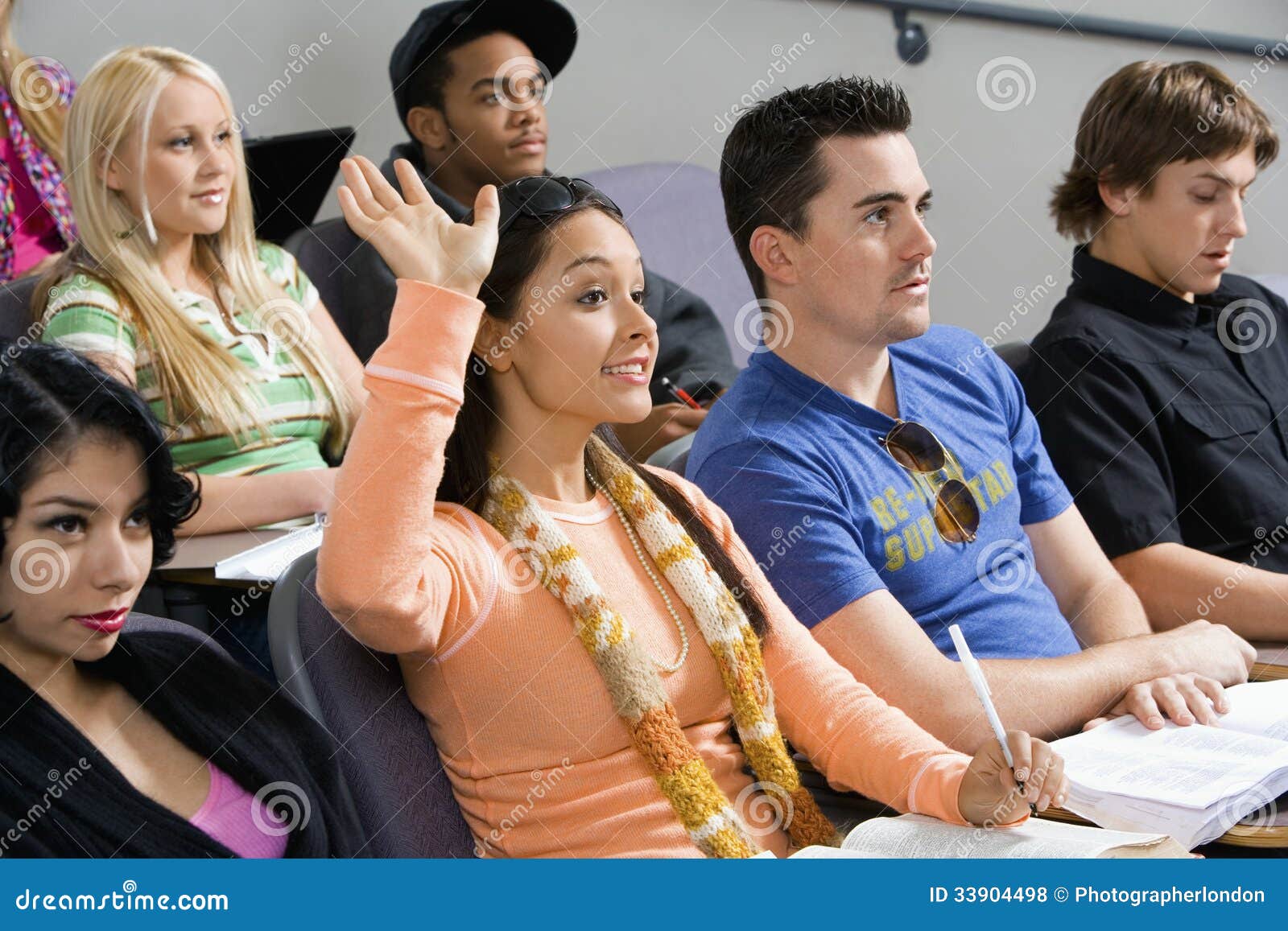Student Raising Hand during Class Lecture Stock Photo - Image of ...