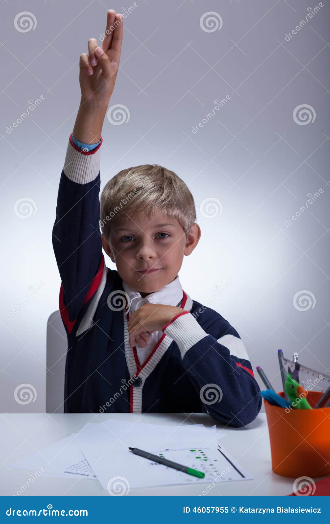 Student raising his hand stock image. Image of indoors - 46057955