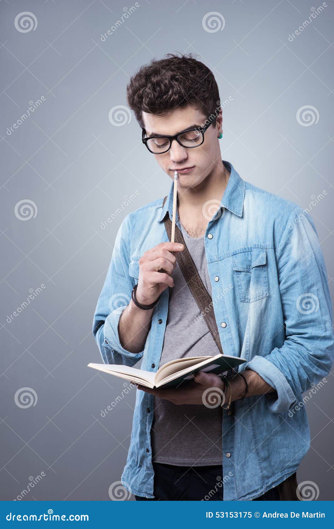 Student reading a book stock image. Image of shirt, reading - 53153175