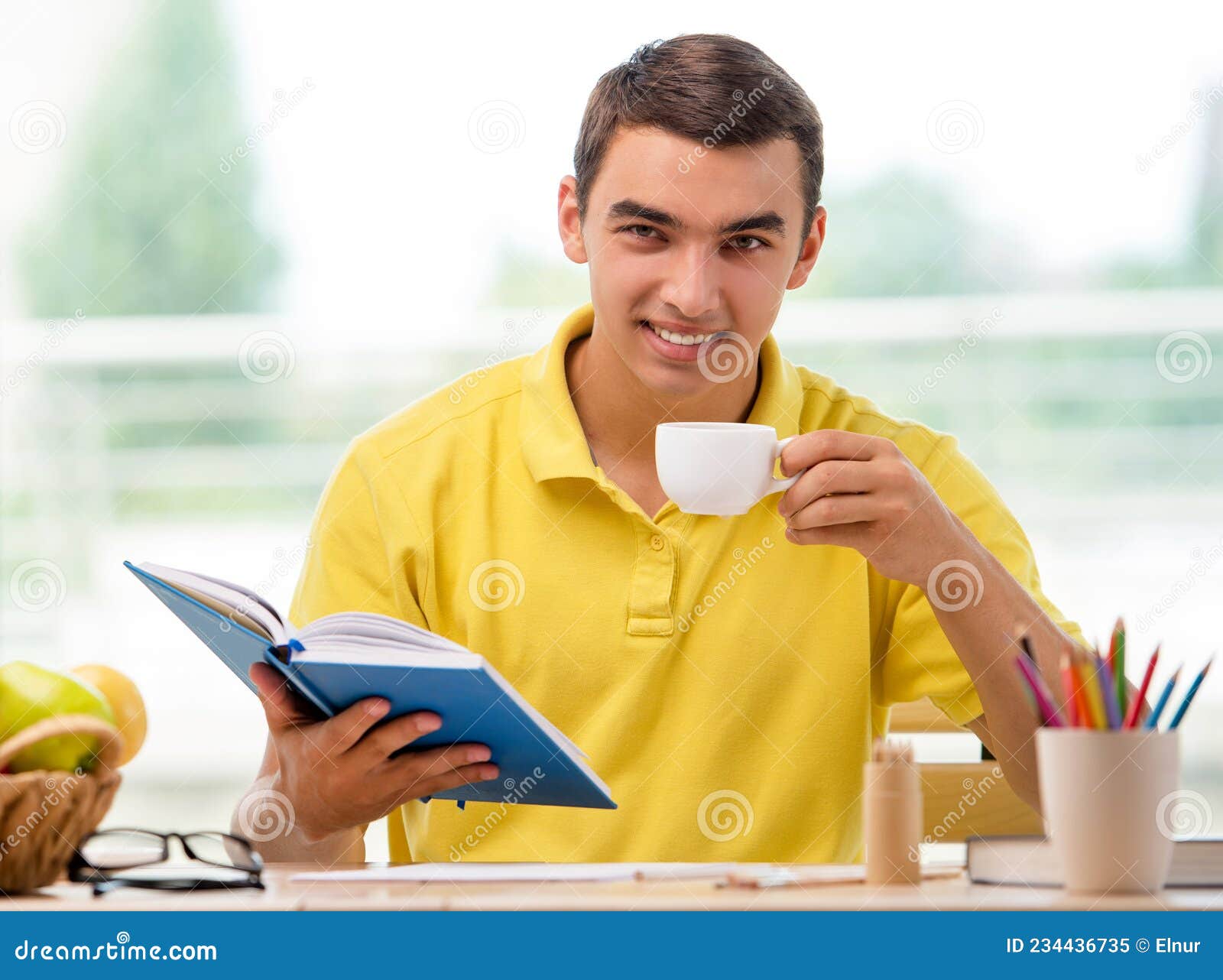 Student Reading Book and Drinking Tea Stock Image - Image of indoors ...