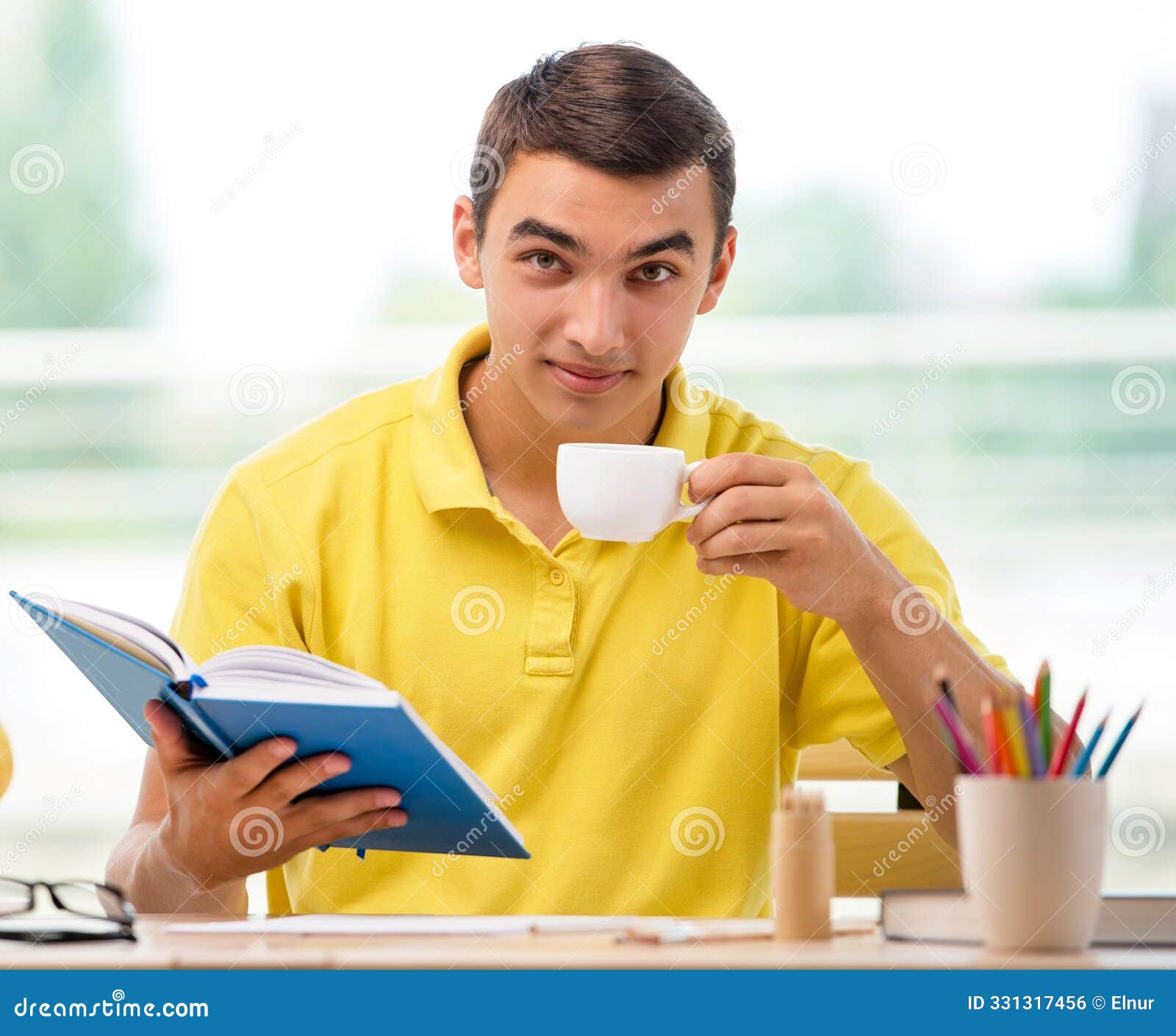 Student Reading Book and Drinking Tea Stock Photo - Image of peaceful ...