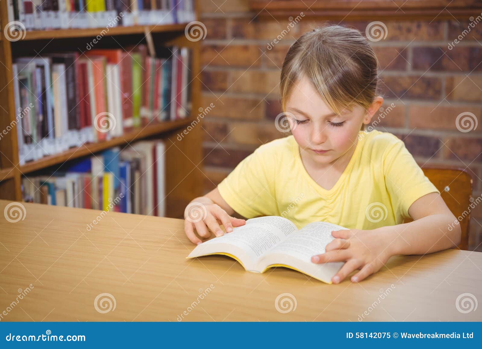 Student reading a book stock image. Image of classroom - 58142075