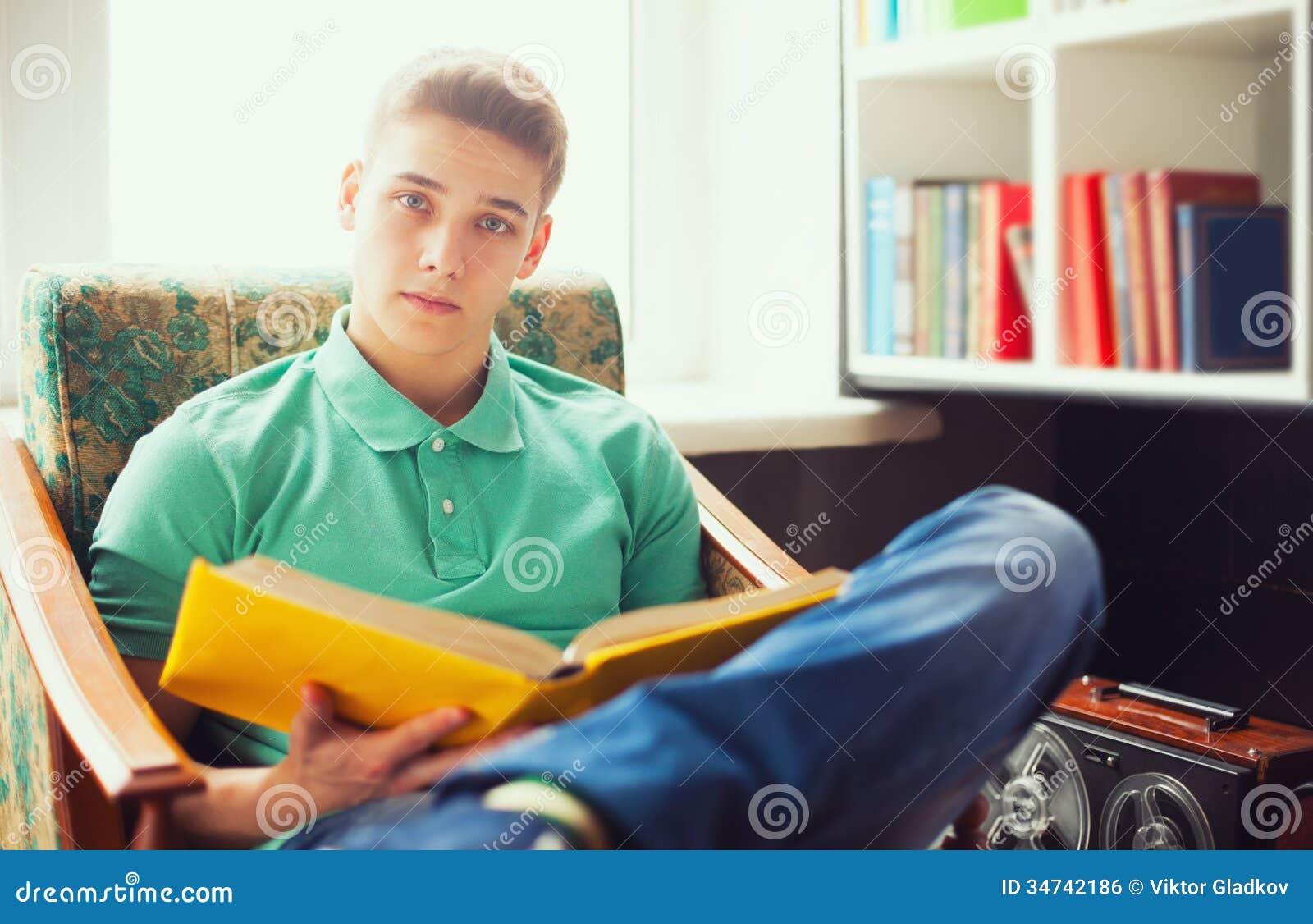 Student Reading Book at Home Stock Photo - Image of college, human ...