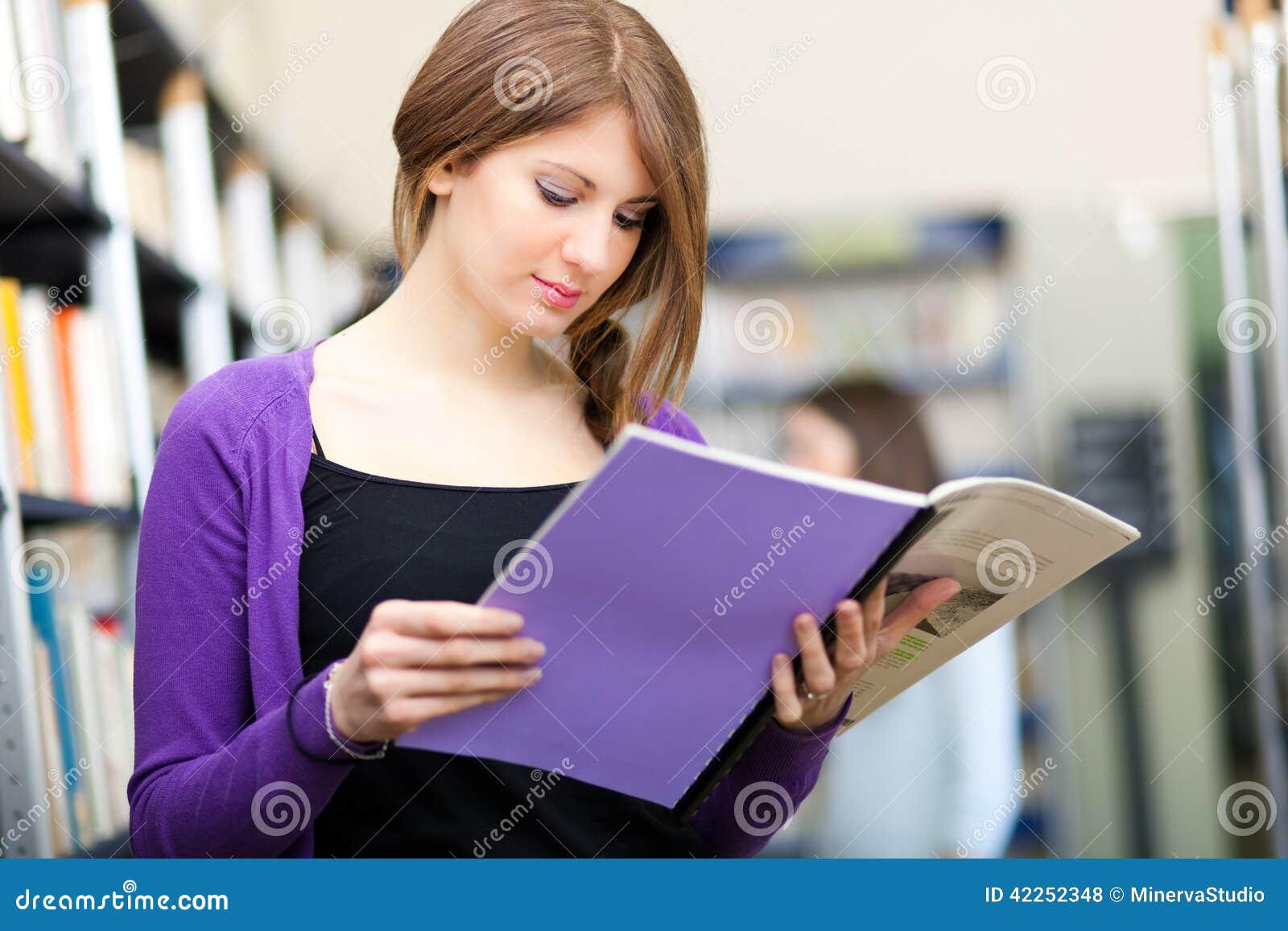 Student Reading a Book in a Library Stock Photo - Image of learning ...