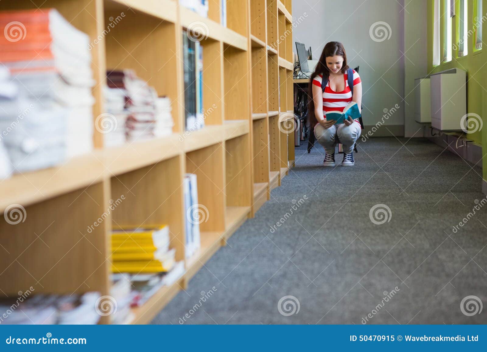 Student Reading Book in Library Stock Image - Image of campus, holding ...