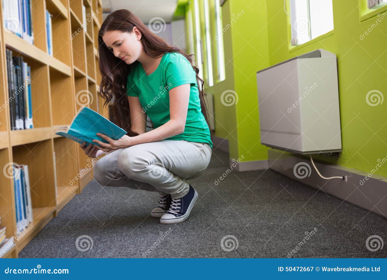 Student Reading Book in Library Stock Image - Image of smiling, adult ...