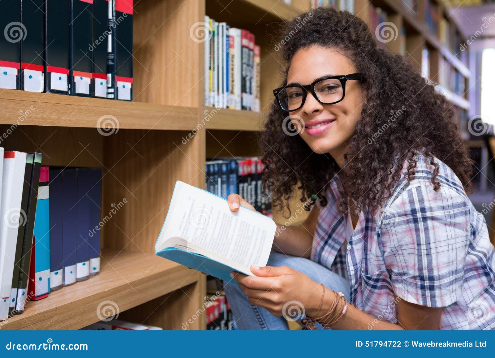 Student Reading Book in Library Stock Photo - Image of academic ...