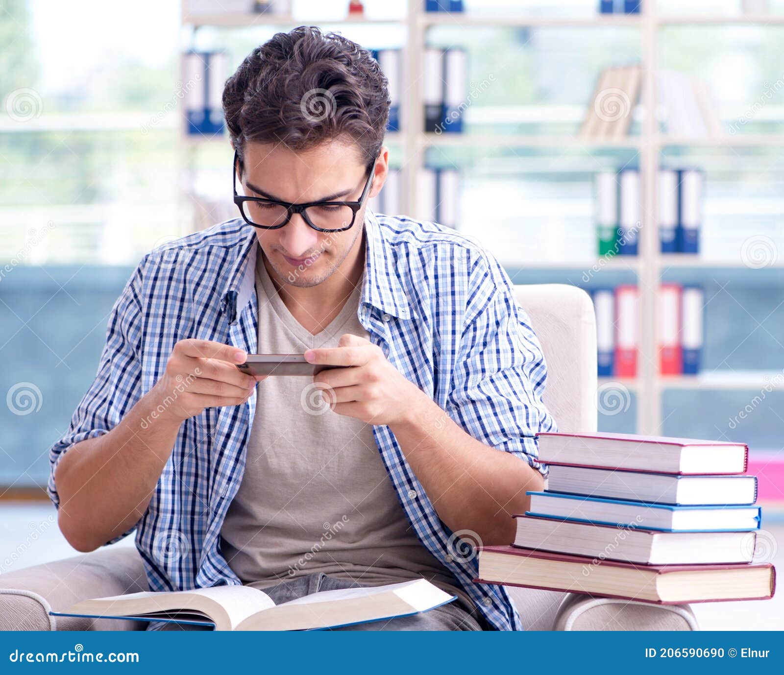 Student Reading Books and Preparing for Exams in Library Stock Photo ...
