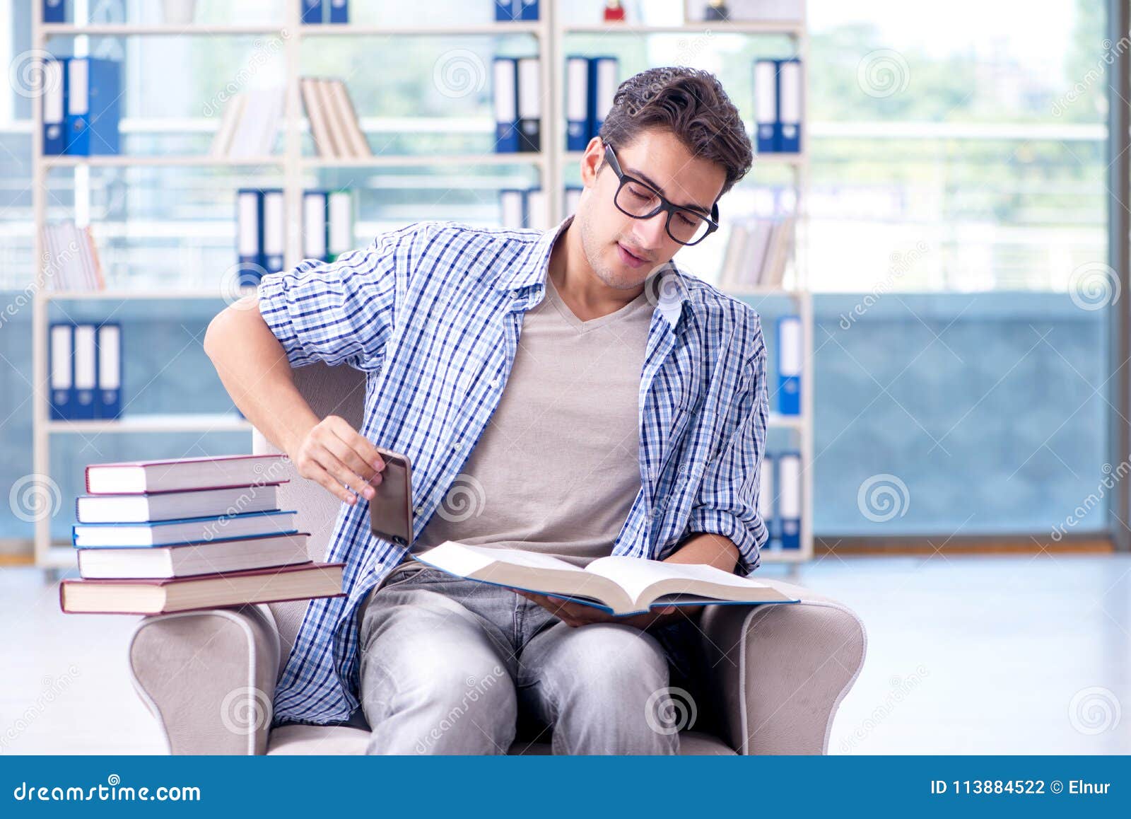 The Student Reading Books and Preparing for Exams in Library Stock ...
