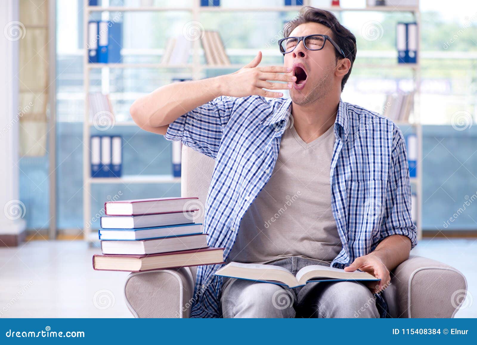 The Student Reading Books and Preparing for Exams in Library Stock ...