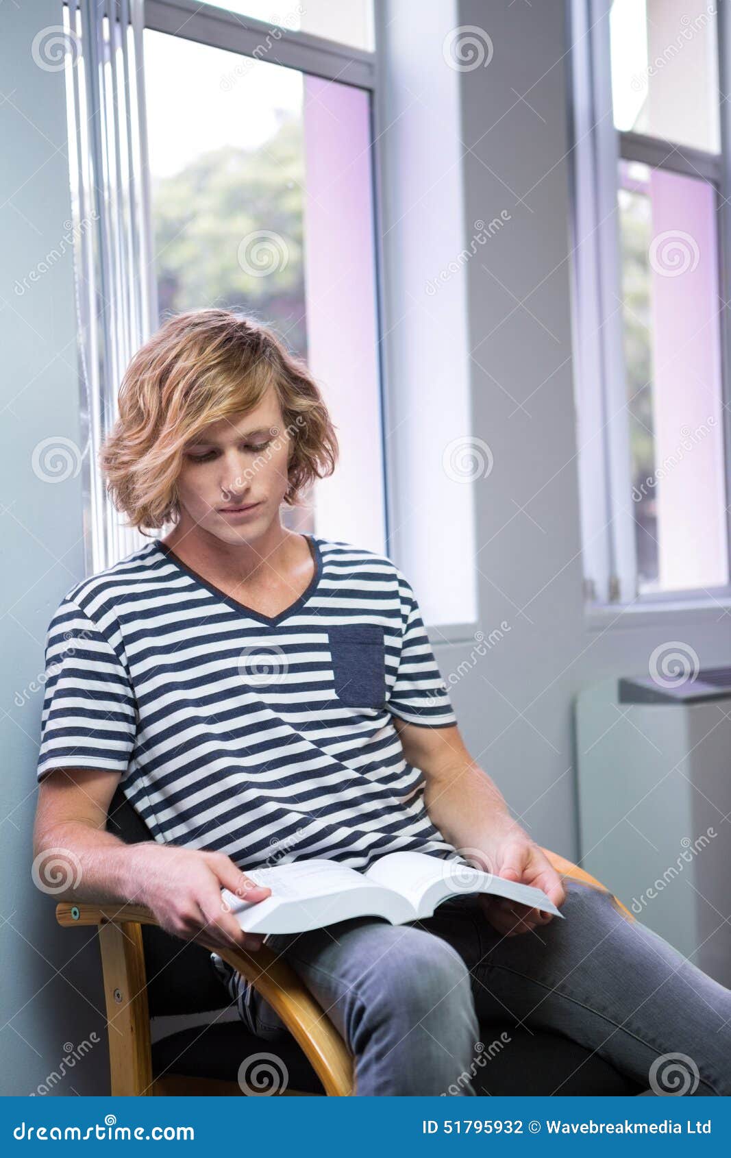 Student reading in library stock photo. Image of studying - 51795932