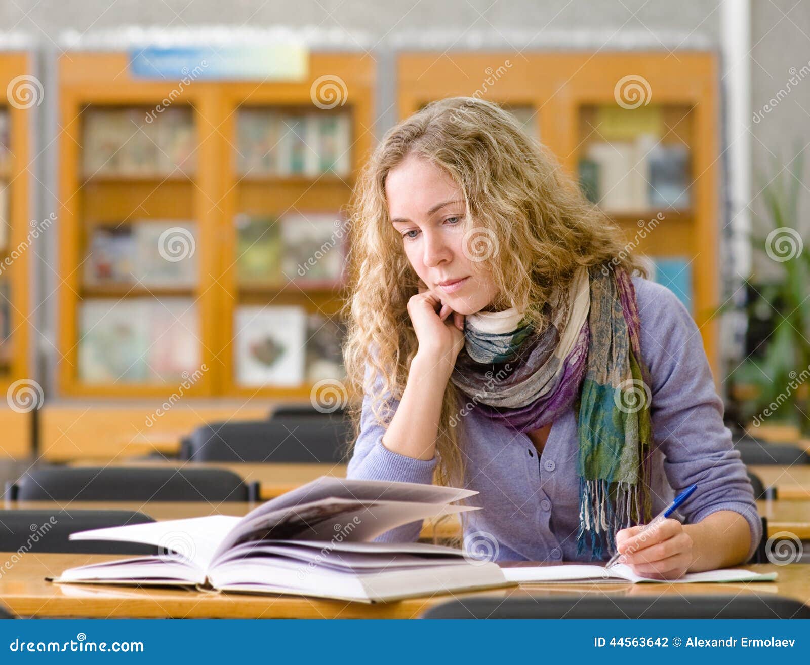 Student Reads the Book in Library Stock Photo - Image of caucasian ...