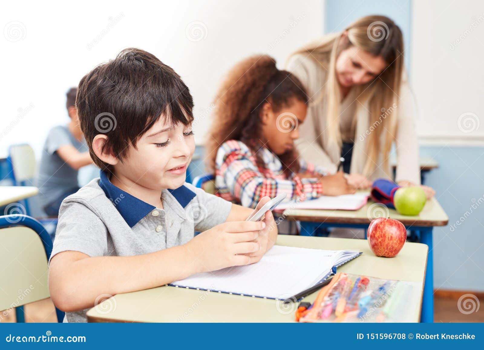 Student Reads or Writes Text Messages in Class Stock Photo - Image of ...