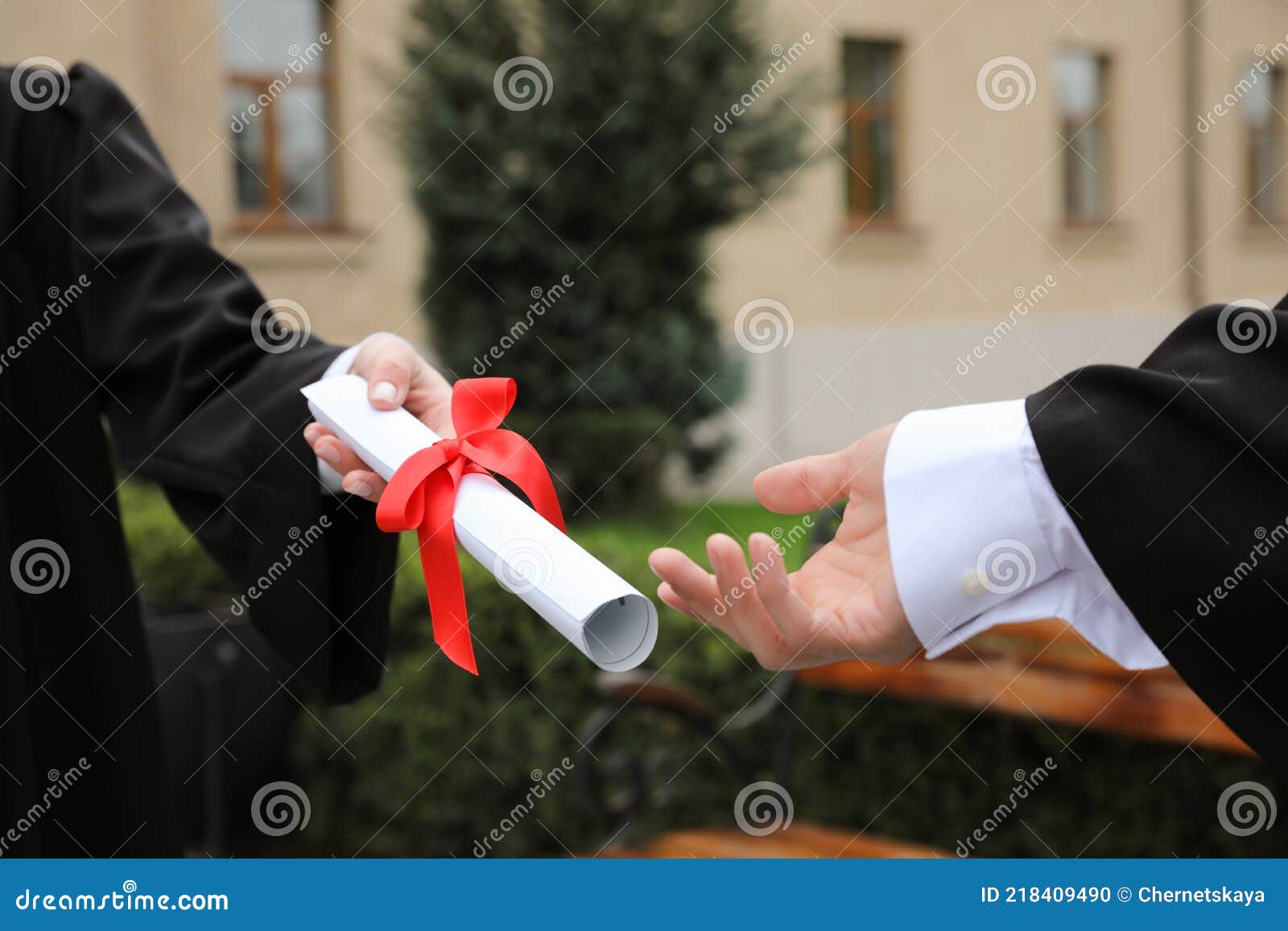 Student Receiving Diploma during Graduation Ceremony Outdoors, Closeup ...
