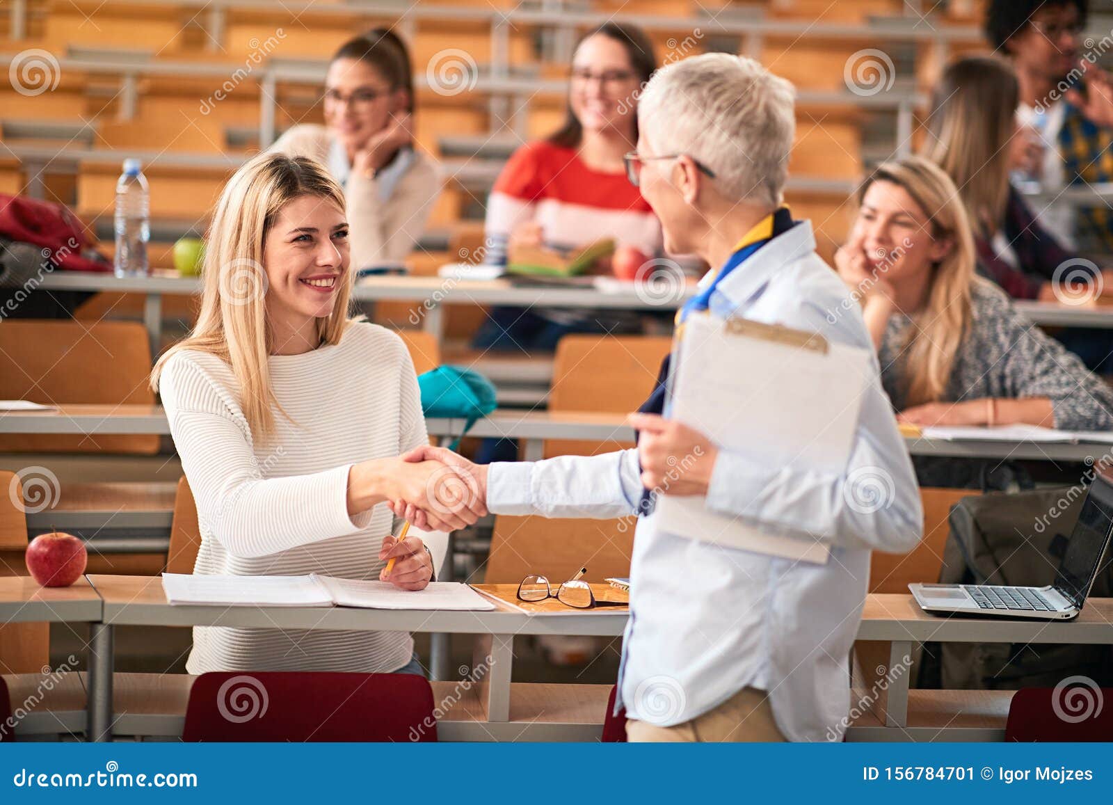 Student Receiving an Successful Exam in a Classroom Stock Image - Image ...