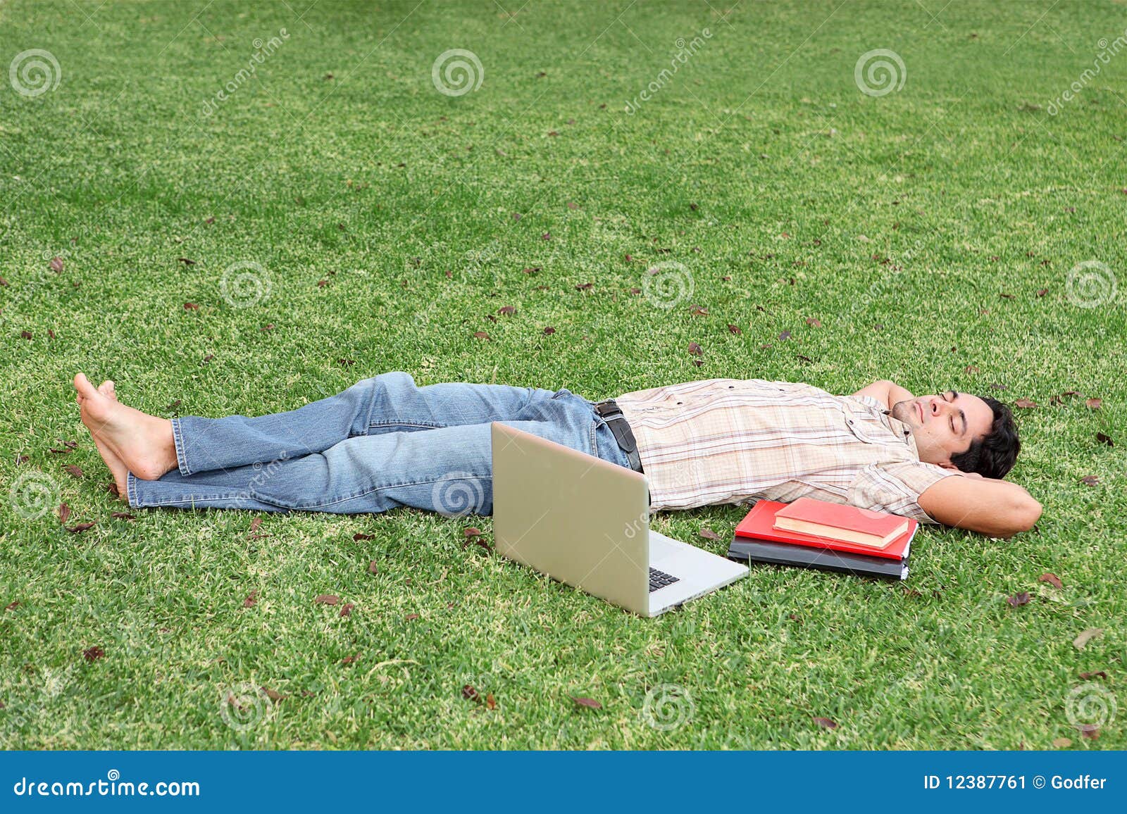 Student relaxing on campus stock image. Image of teenager - 12387761