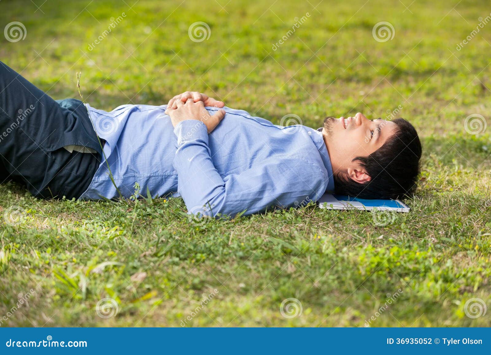 Student Relaxing on Grass at University Campus Stock Photo - Image of ...