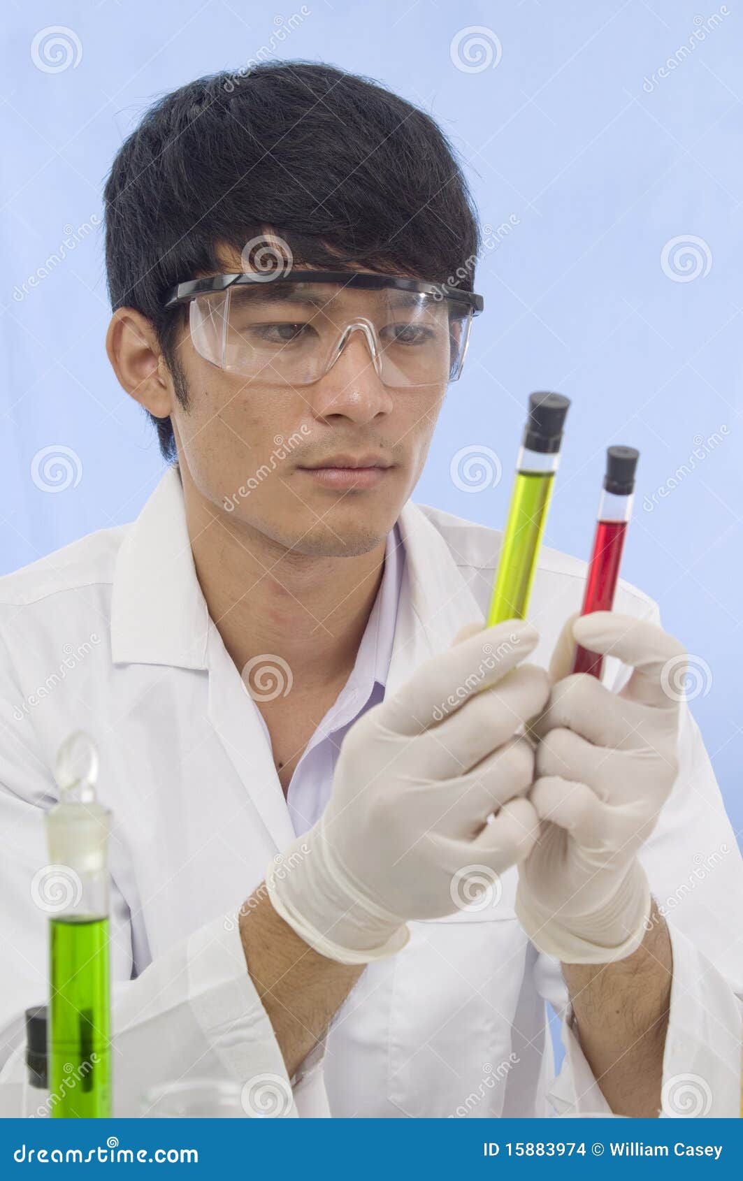 Student Researcher with 2 Test Tubes Stock Photo - Image of accurate ...